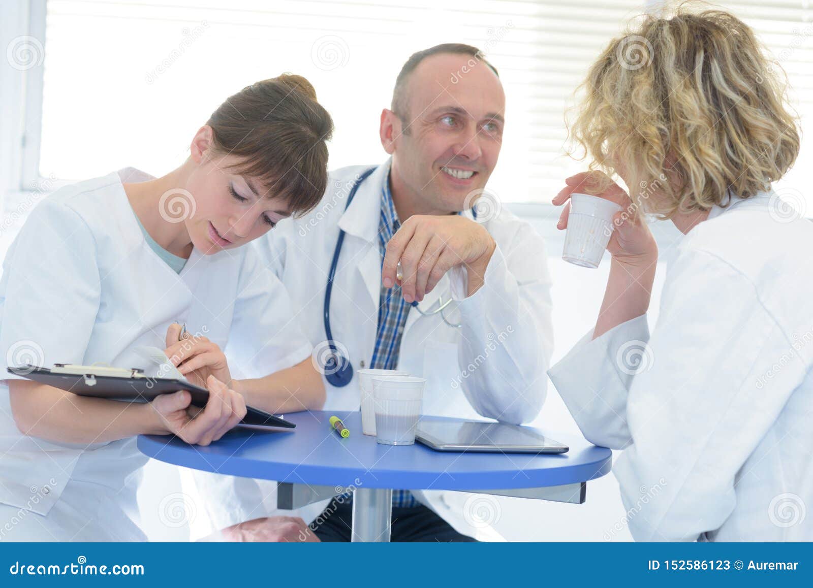 Break at work in hospital stock image. Image of specialist - 152586123