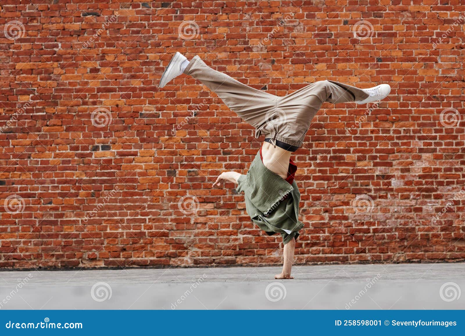 Breakdance Action Pose stock image. Image of young, brick - 258598001