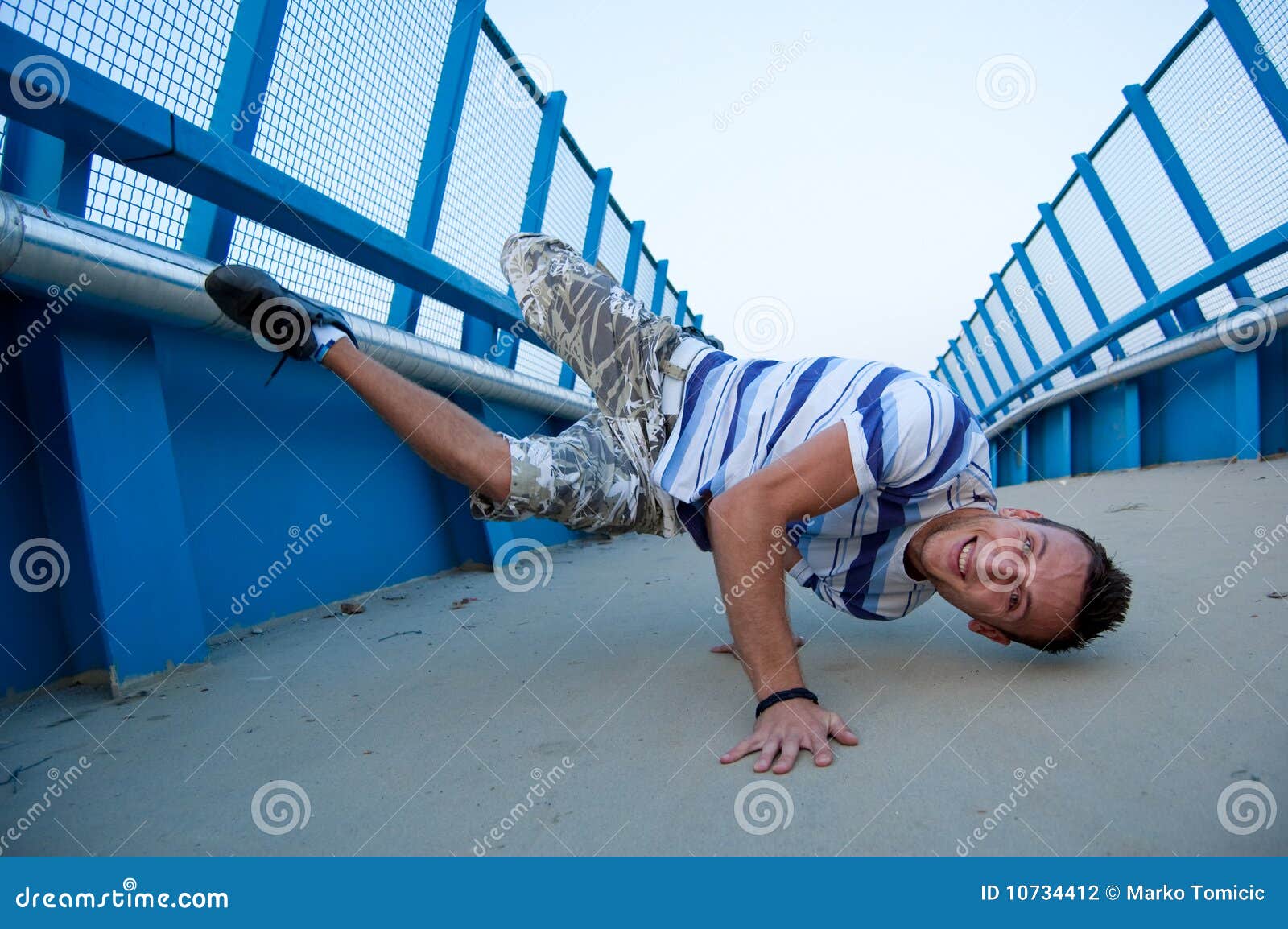 Breakdancer on bridge stock photo. Image of body, urban - 10734412