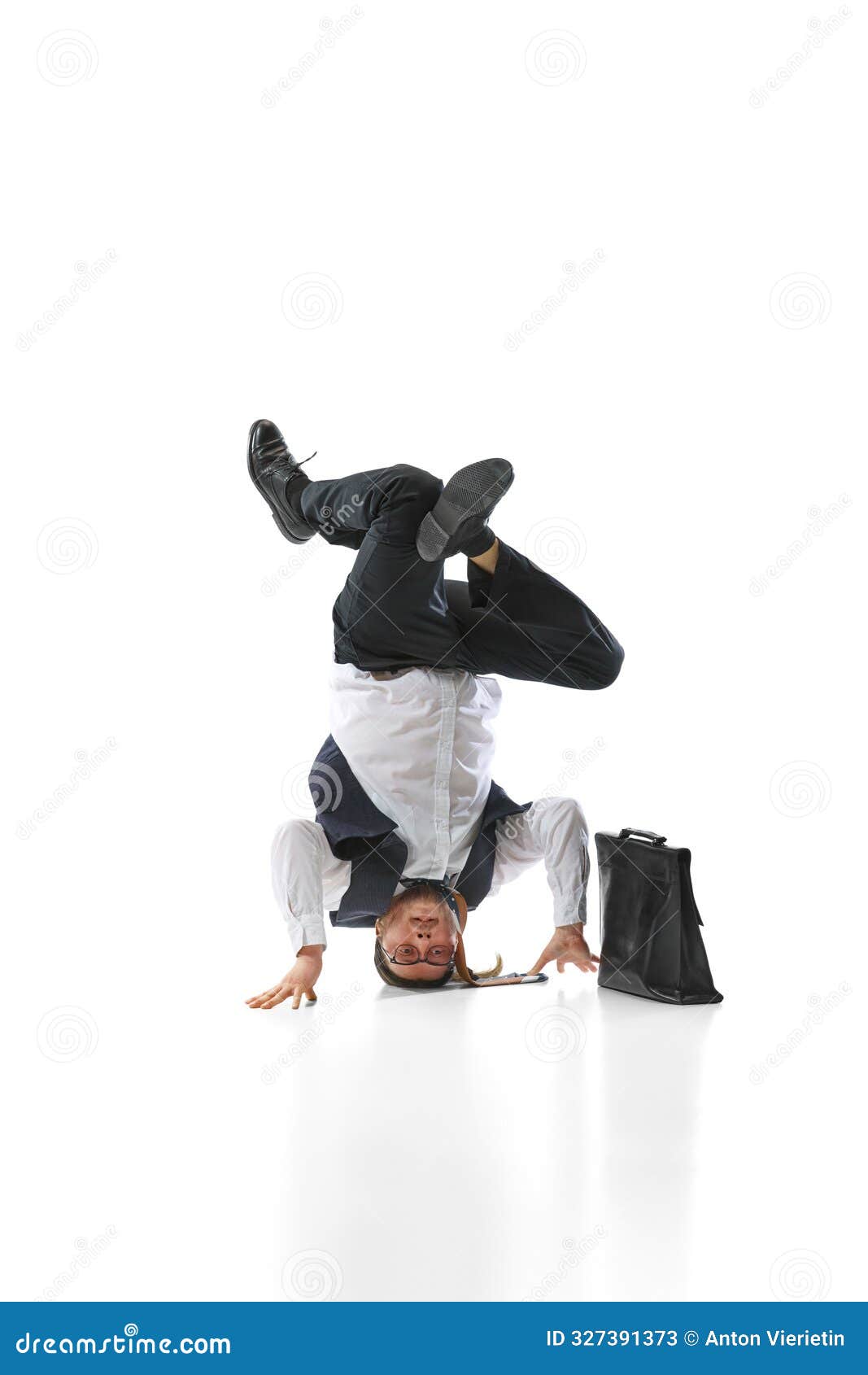 Breakdancer Dressed Suit and Tie Executes Headstand Next To Briefcase ...