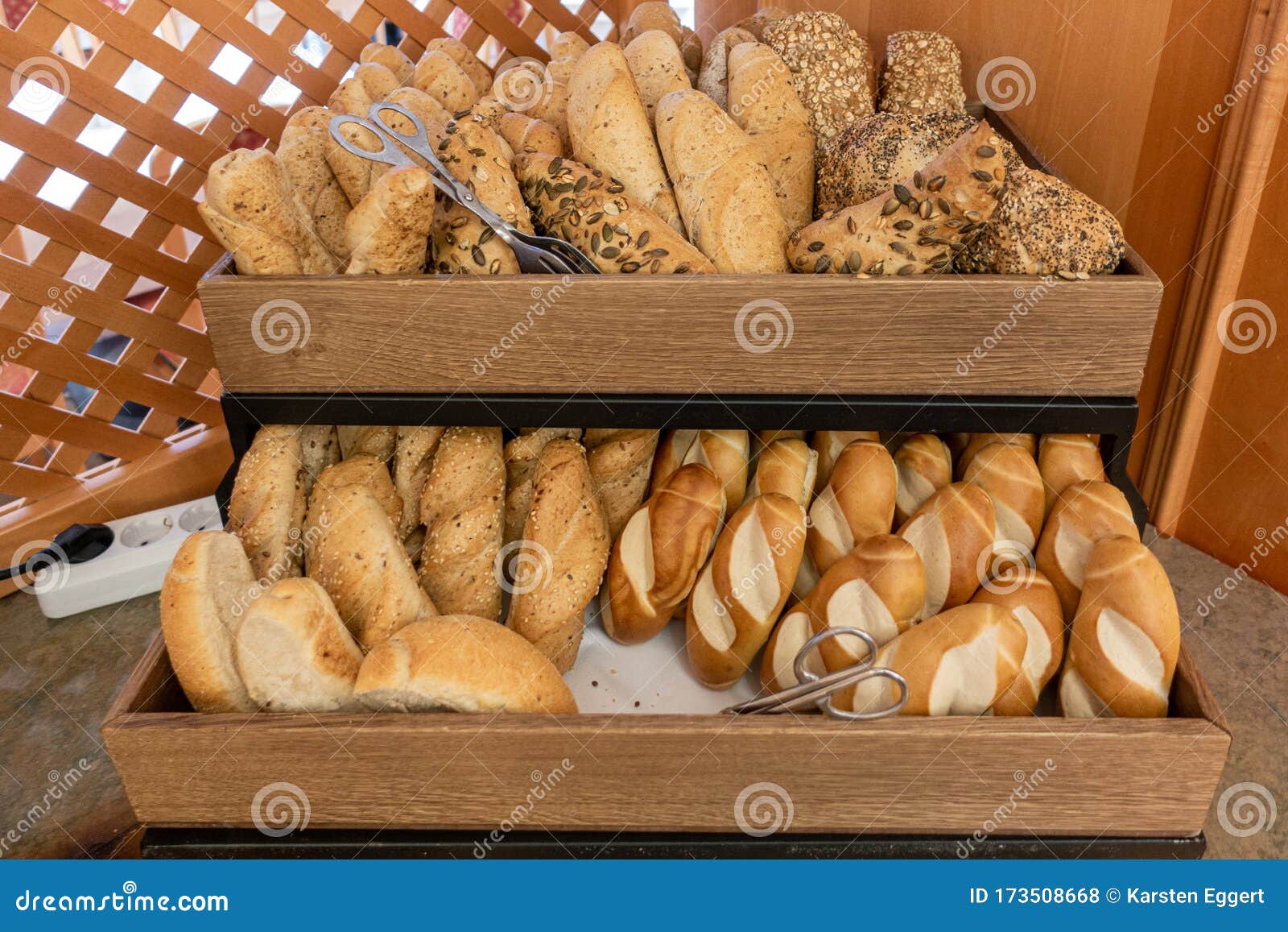 A Breakfast Buffet There are Two Baskets Filled with Different Kinds of ...