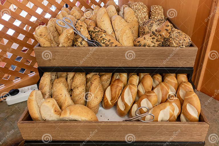 A Breakfast Buffet There are Two Baskets Filled with Different Kinds of ...