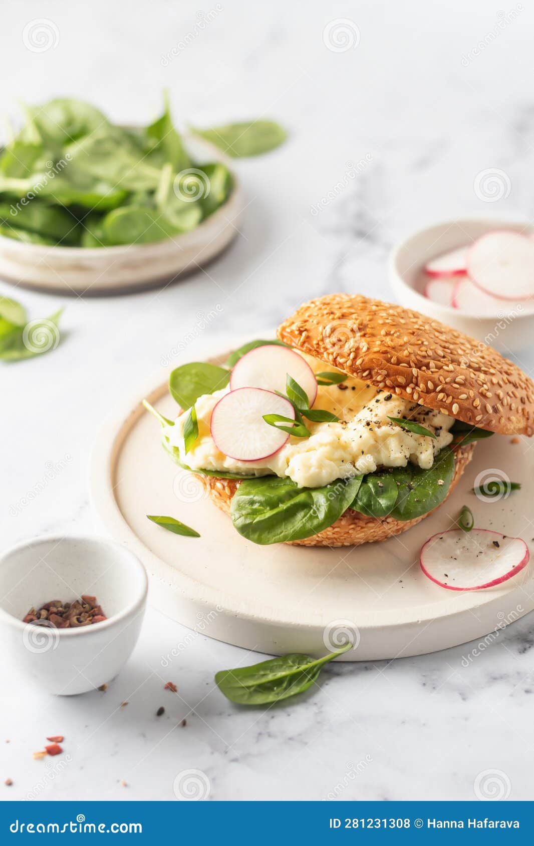 Breakfast Burger with Scrambled Eggs, Spinach, Radish Slices on White ...