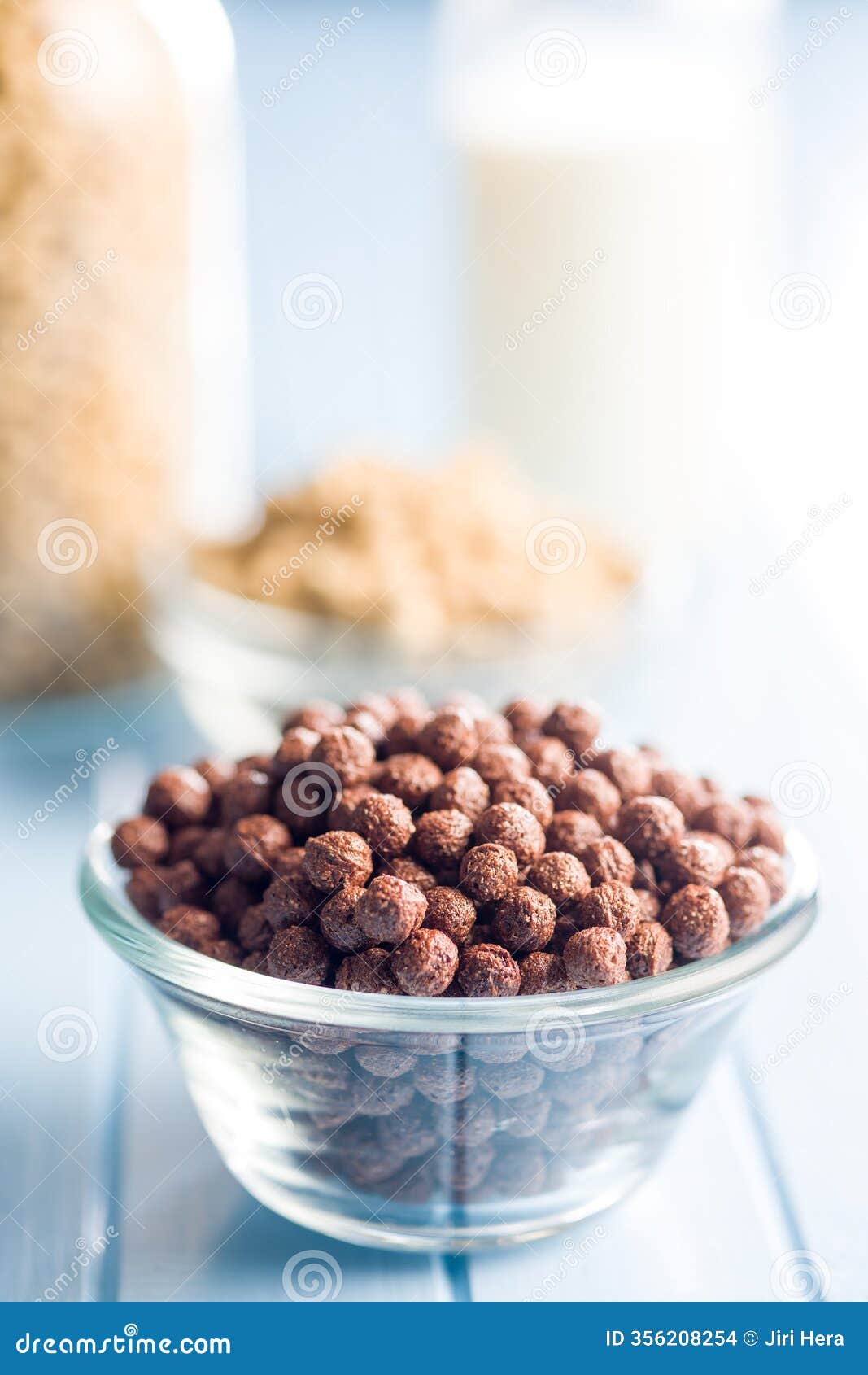 Breakfast Cereal Chocolate Balls in Bowl on Blue Table Stock Photo ...