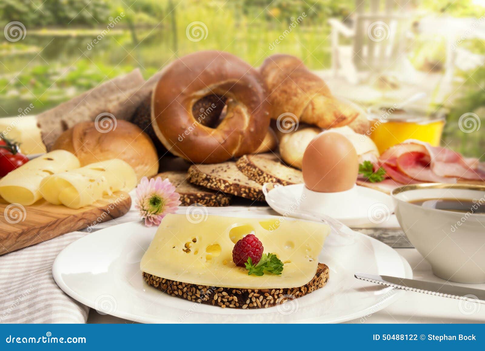Breakfast with Cheese Bread, Coffee, Egg,ham and Jam in Garden Stock ...