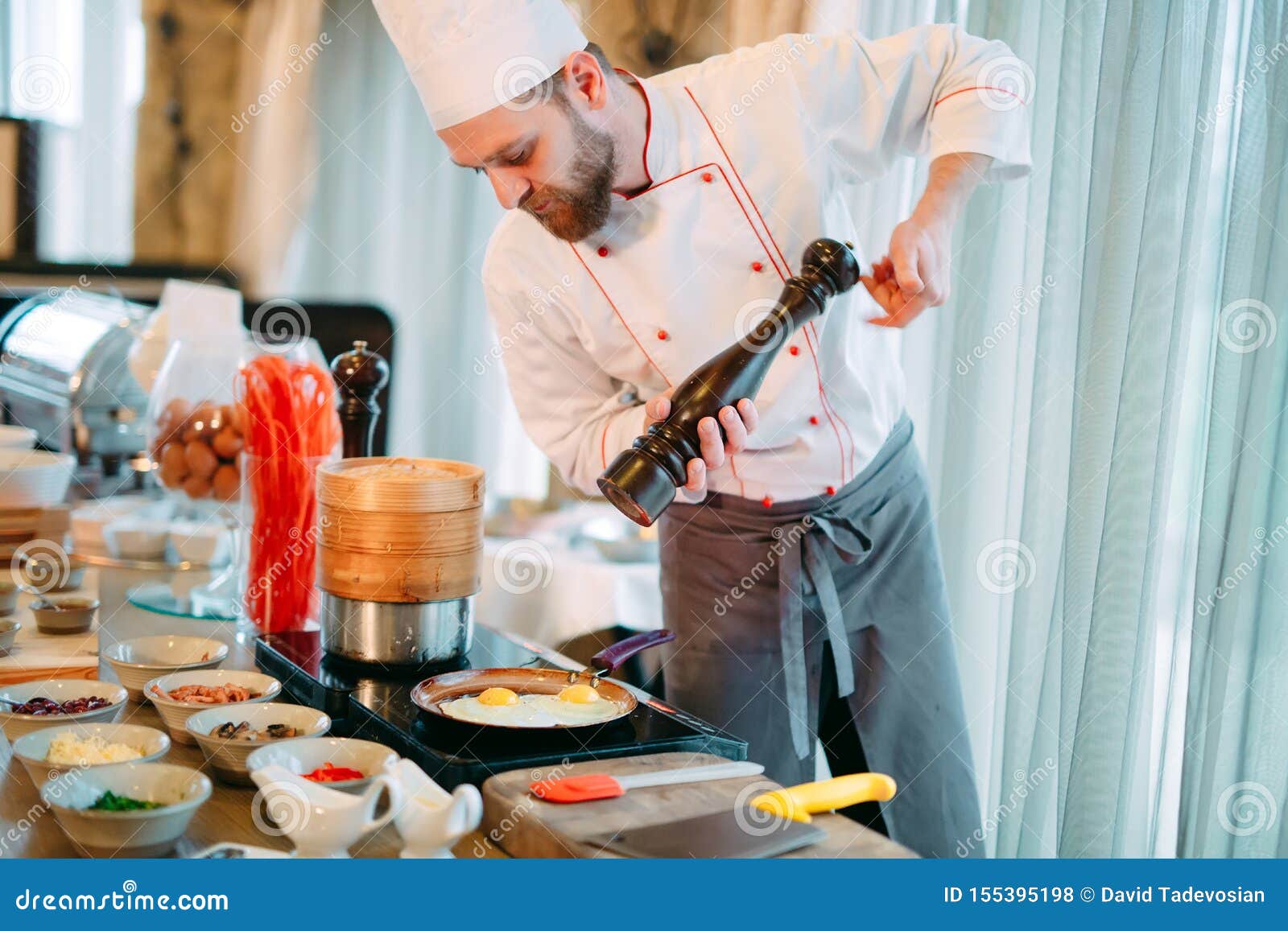Breakfast. the Chef Prepares Eggs for Breakfast. Stock Photo - Image of ...