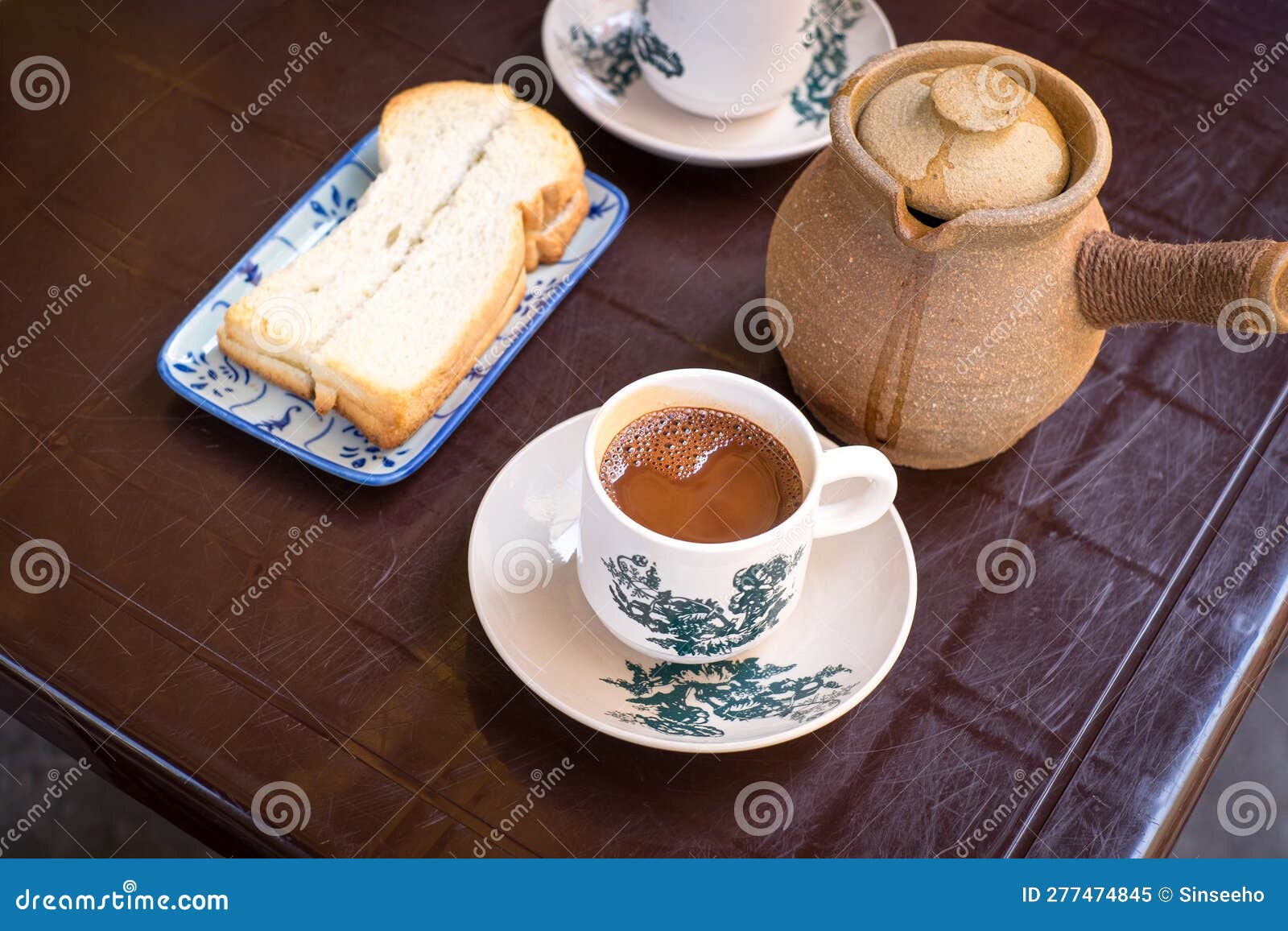 Breakfast with Claypot Coffee and Toast Bread Stock Image - Image of ...