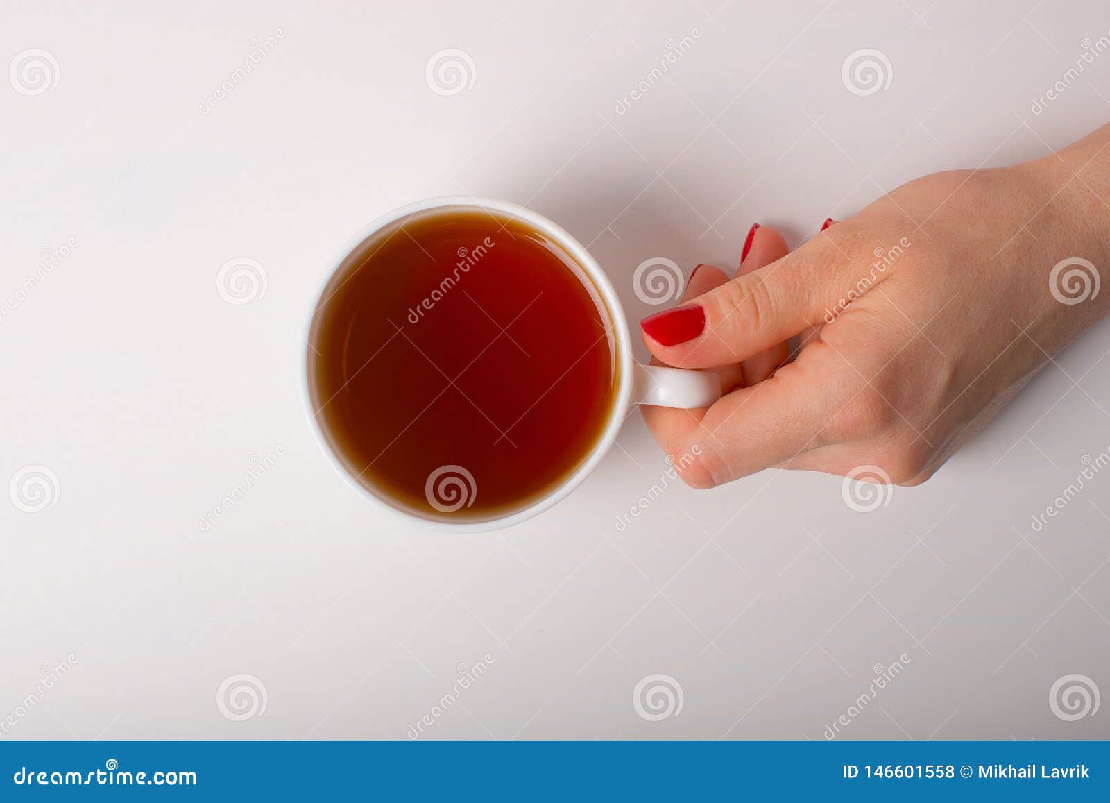 Hand with cup of tea. stock photo. Image of decaffeinated - 146601558