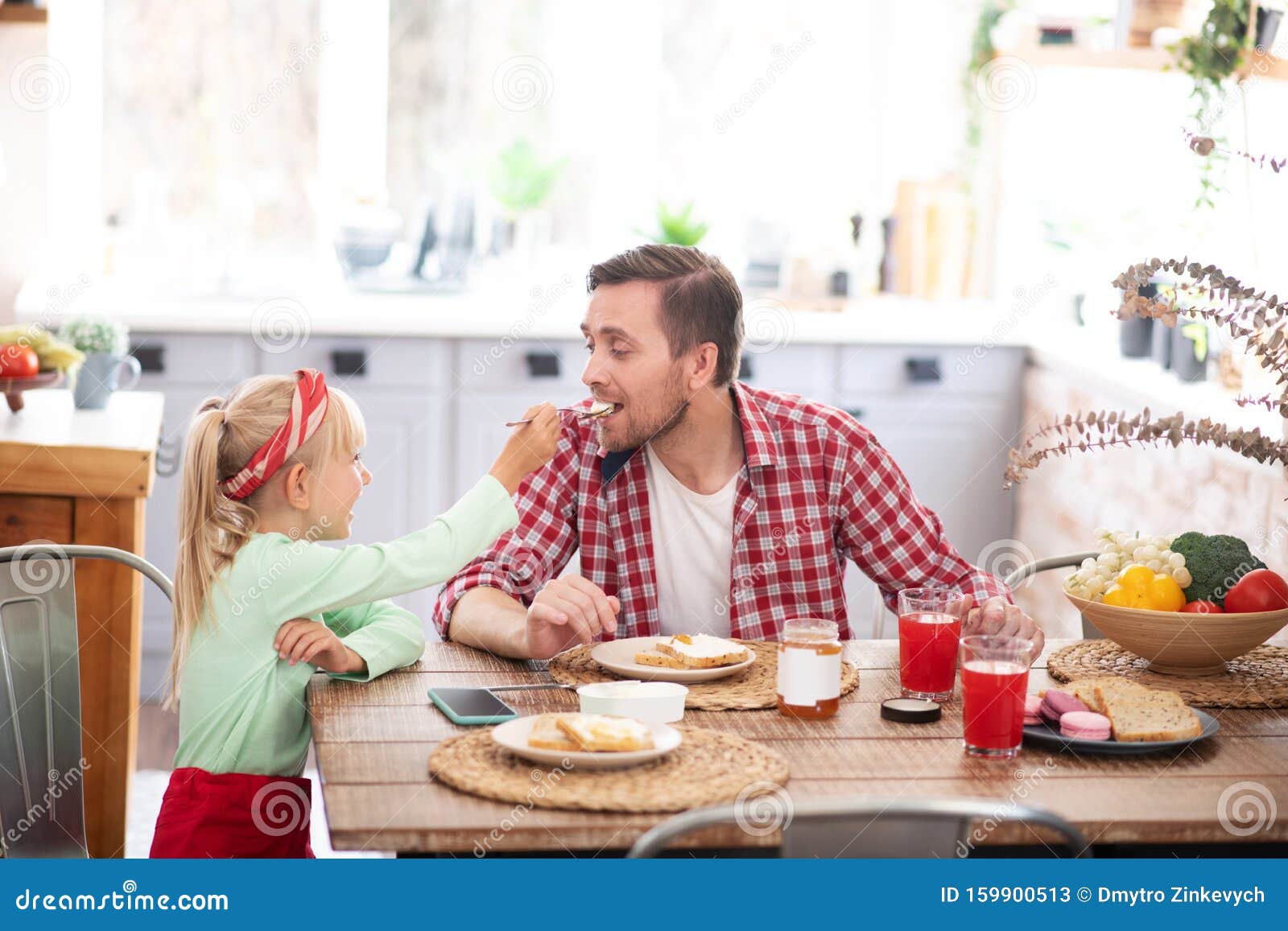Daughter Feeling Joyful while Having Breakfast with Dad Stock Image ...