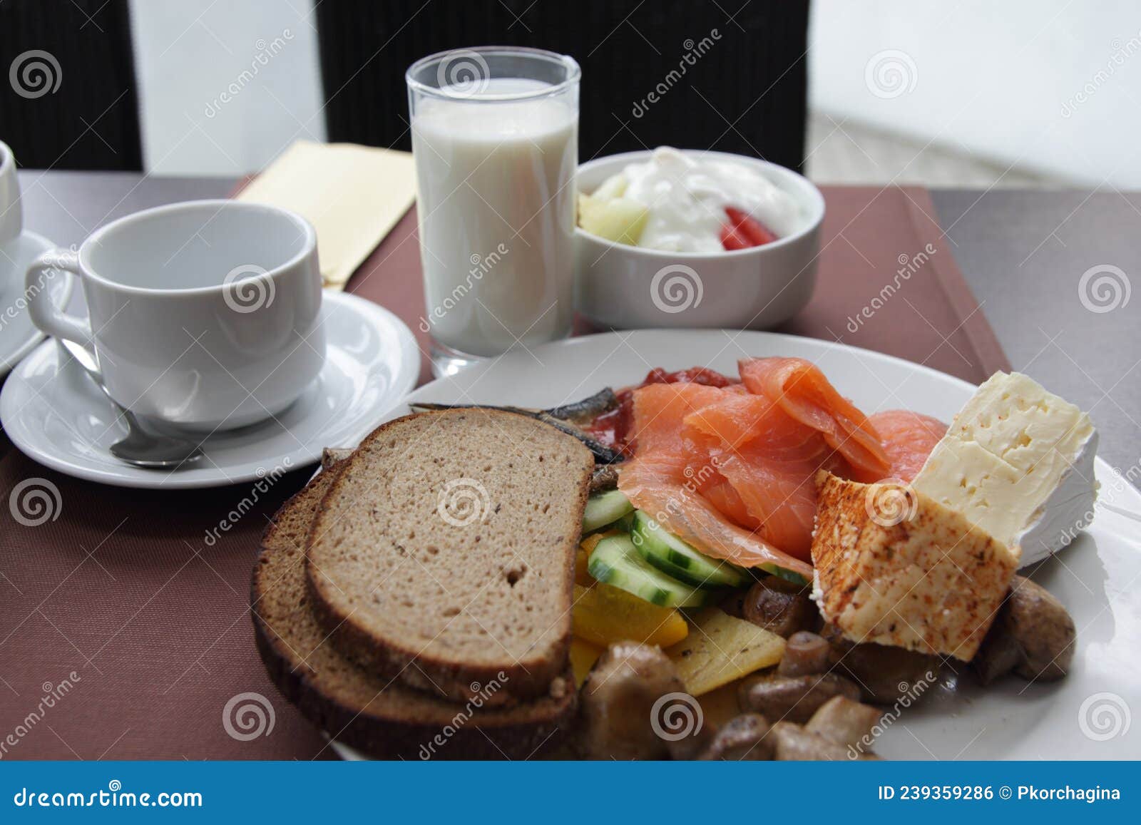 A Breakfast with Fish, Bread and Cheese in a Hotel Stock Photo - Image ...