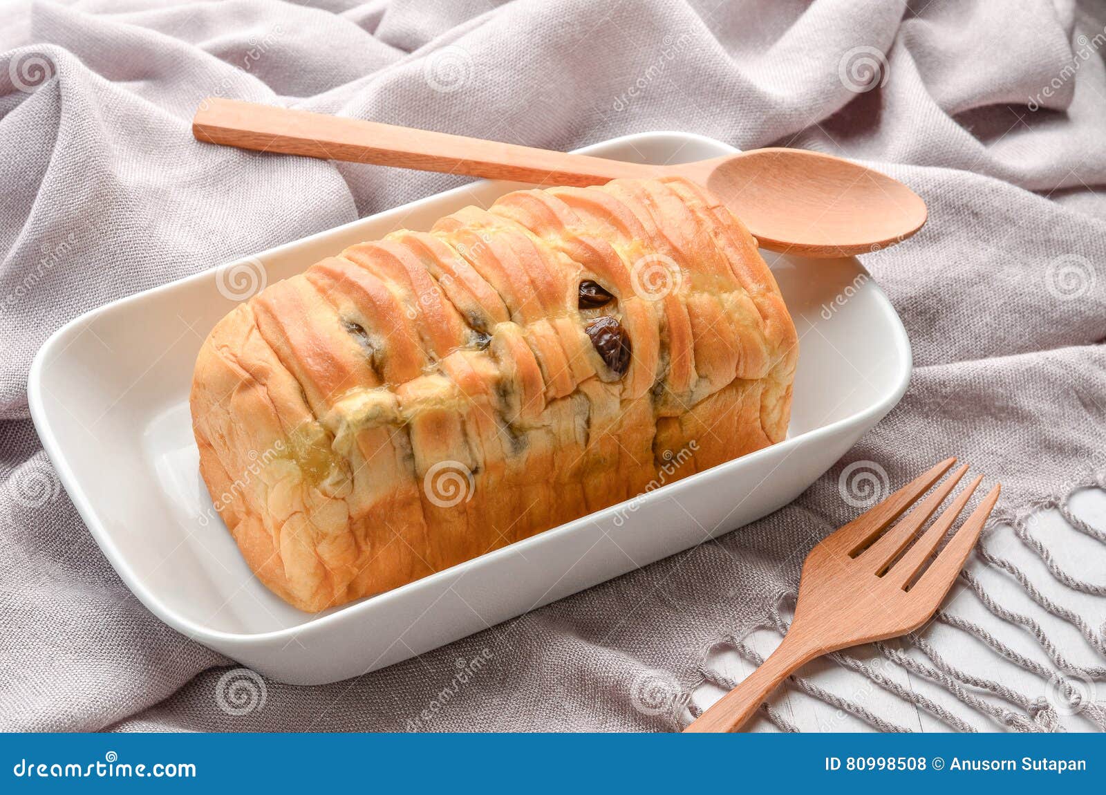 Breakfast with Fresh Raisin Bread ,spoon and Fork on White Plate Stock ...