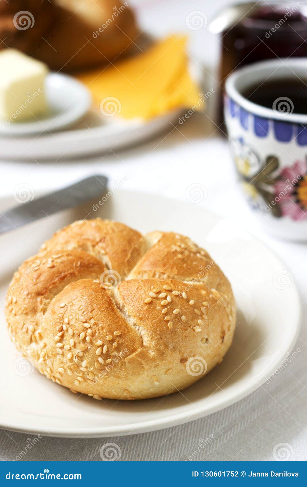 Breakfast with Kaiser Rolls, Currant Jam, Butter and Cheese and Tea ...