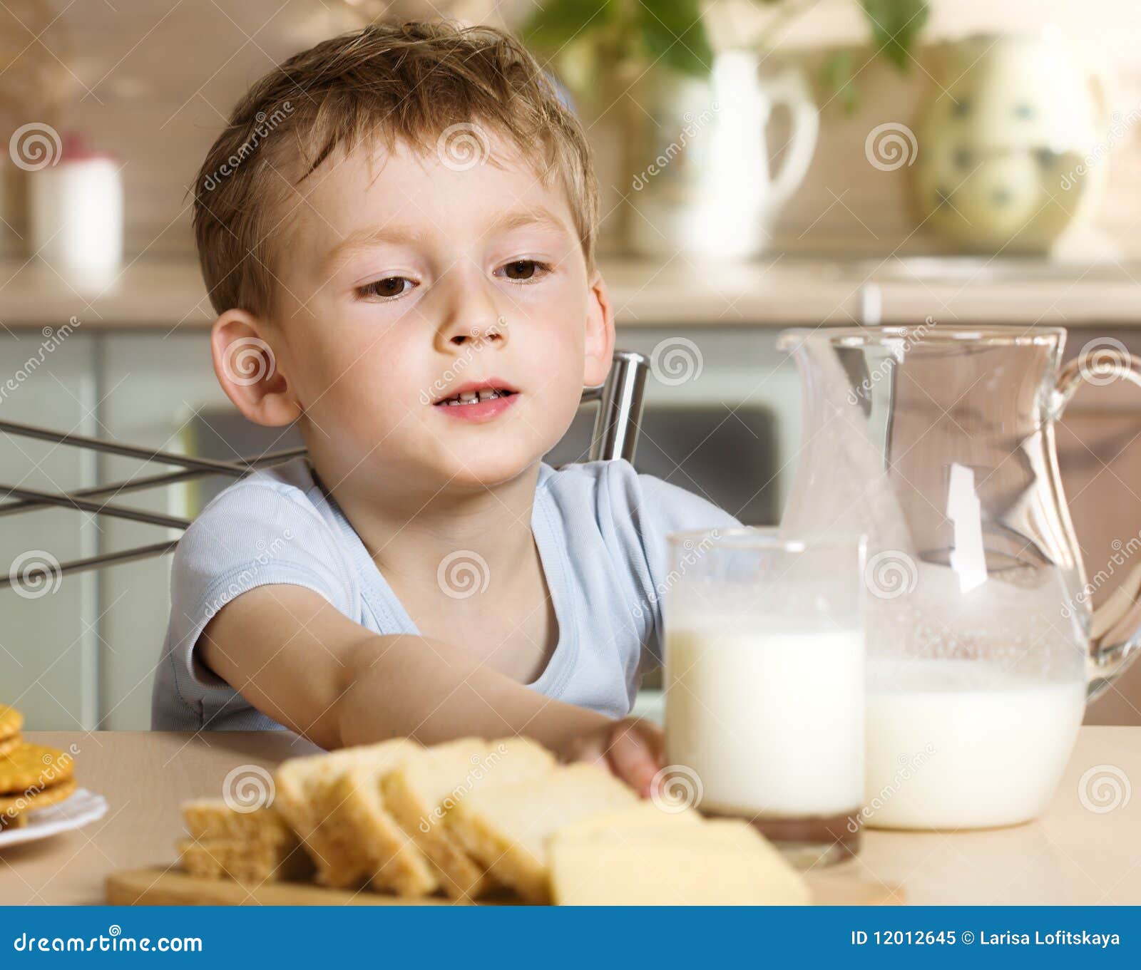 Breakfast of little boy stock image. Image of sitting - 12012645