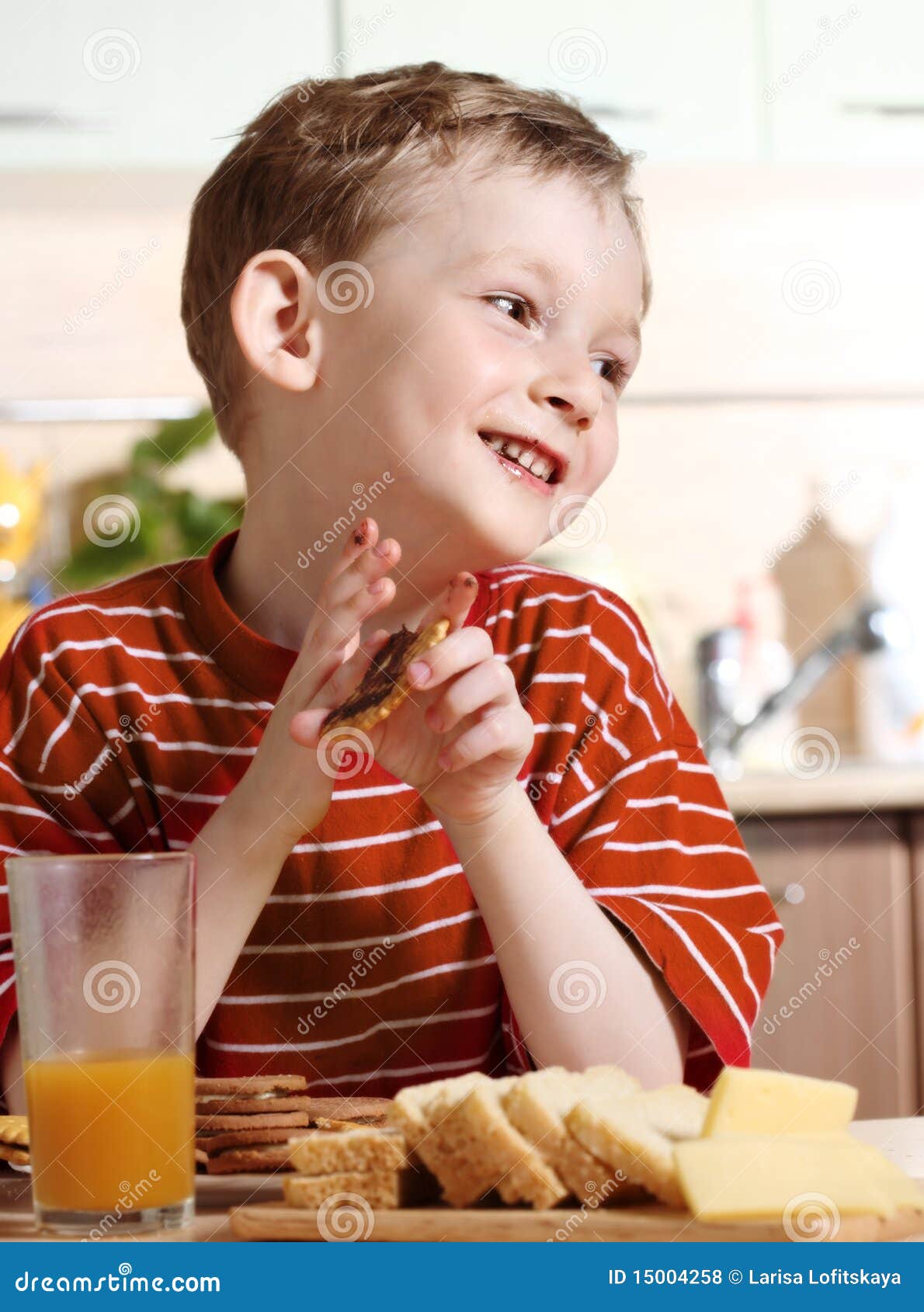 Breakfast of little boy stock photo. Image of portrait - 15004258