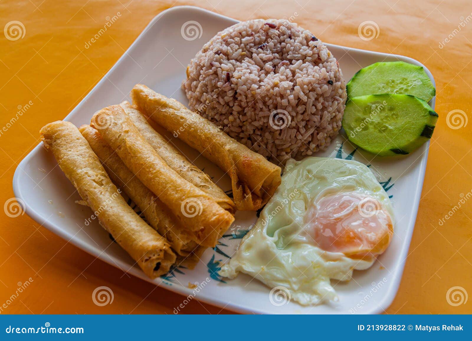 Breakfast in Philippines - Rice with Fried Rolls (lumpia) and E Stock ...