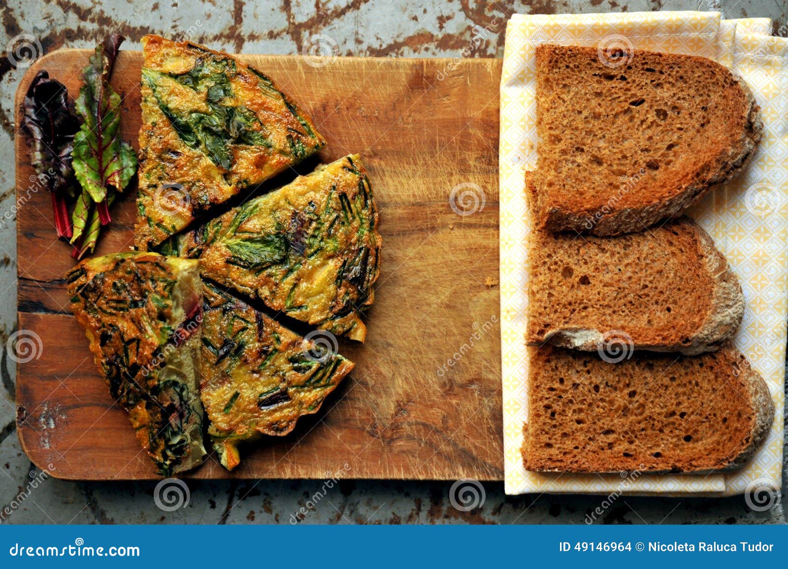 Breakfast with Rustic Frittata and Bread on a Wooden Board Stock Photo ...