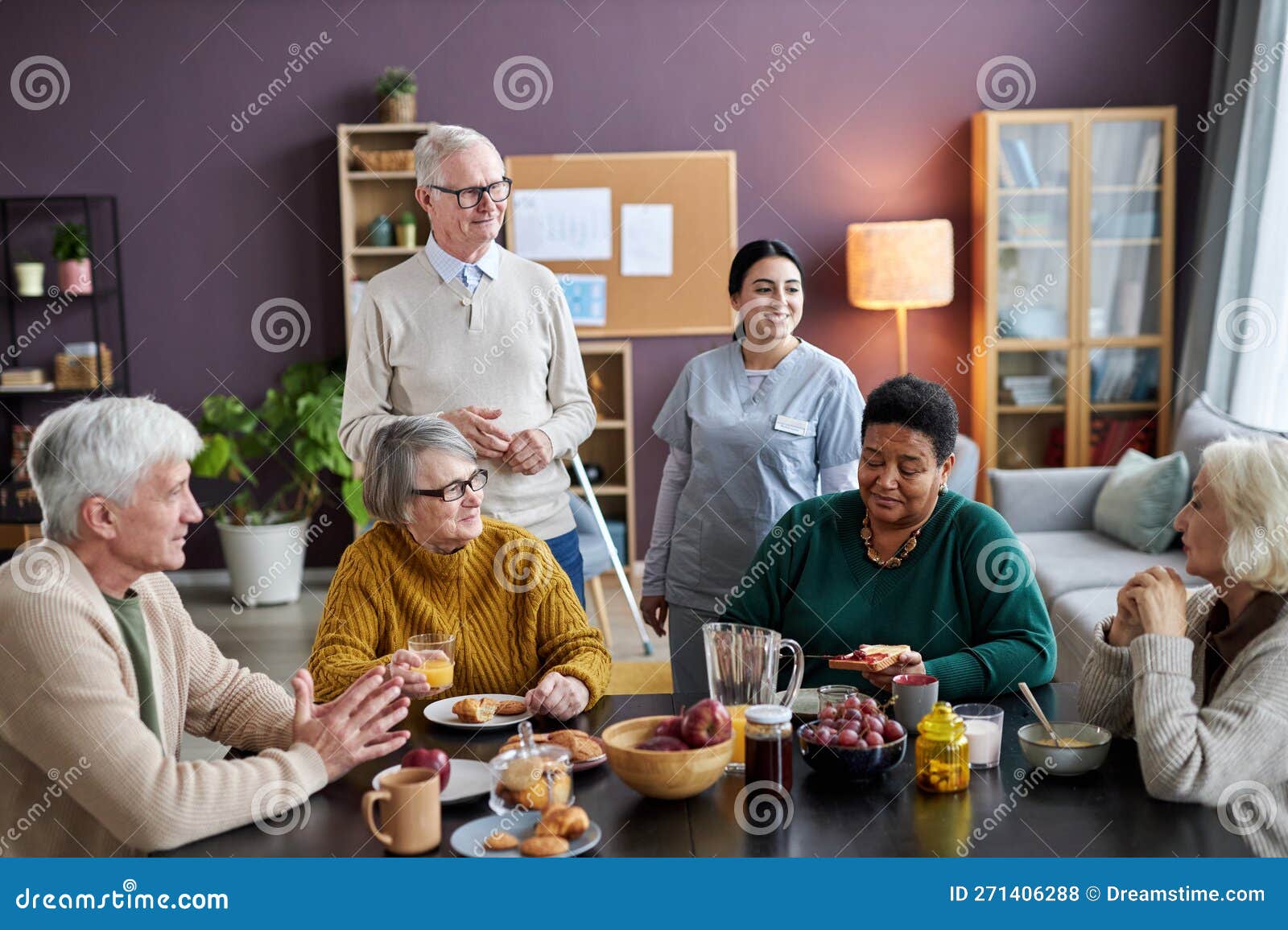 Breakfast Scene in Retirement Home with Smiling Senior People Stock ...