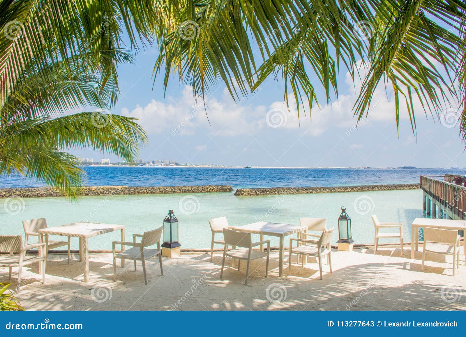 Breakfast Setup with Tables and Chairs at the Tropical Beach Stock ...