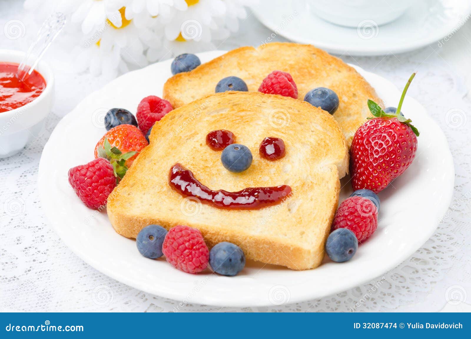 Breakfast with a Smiling Toast, Fresh Berries, Berry Jam Stock Photo ...