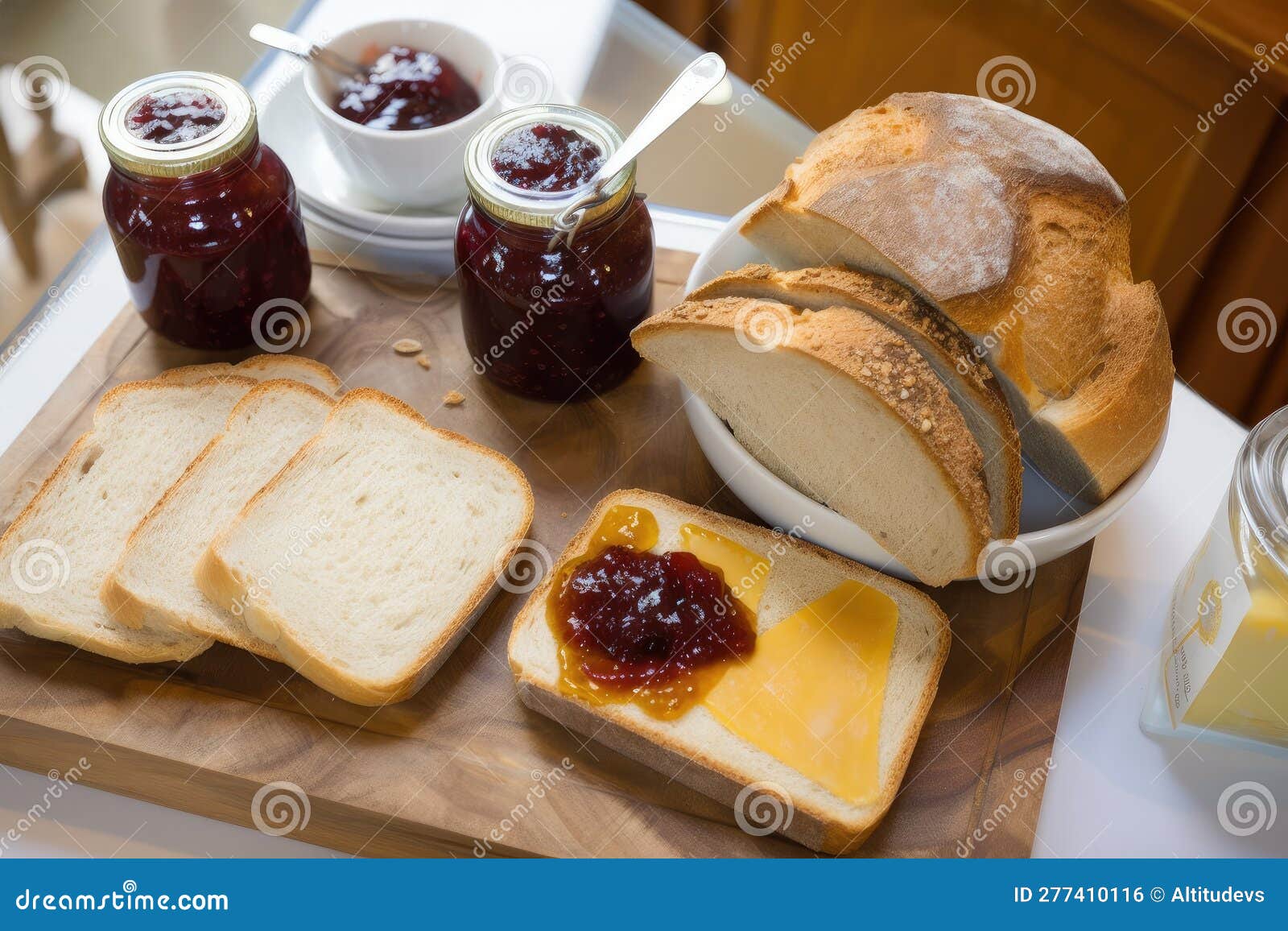 Breakfast Spread, Filled with Fresh Bread and Homemade Jam Stock Photo ...