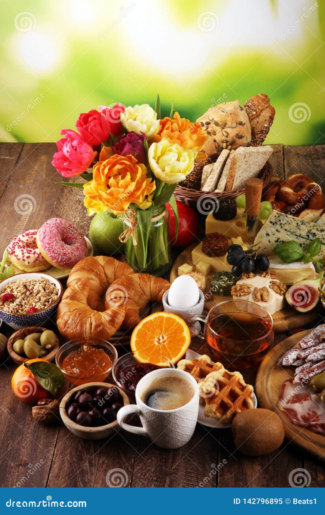 Breakfast on Table with Bread Buns, Croissants, Coffe and Eggs Stock ...