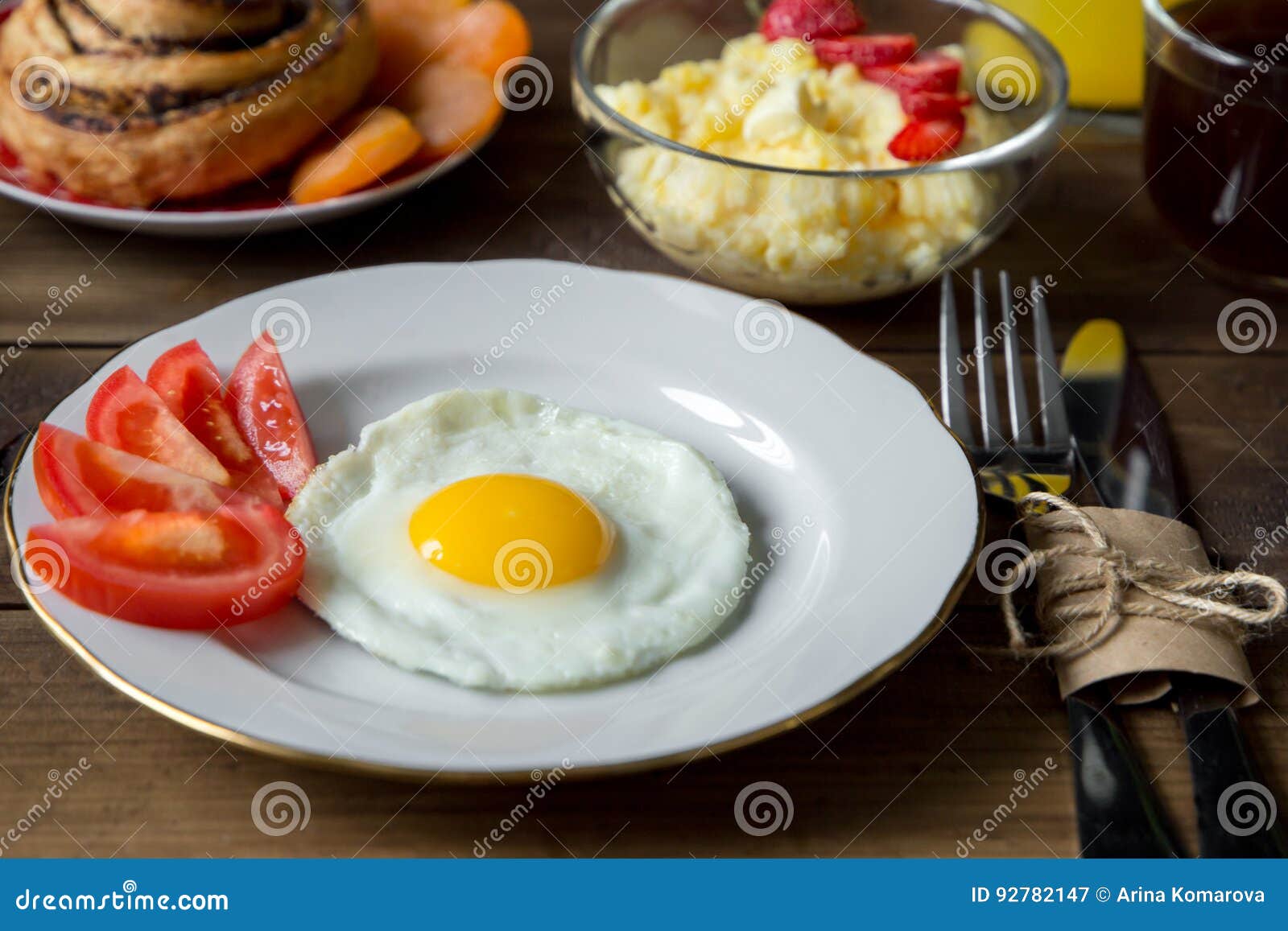 Breakfast Table Served with Corn Porridge, Fried Egg and Juice Stock ...