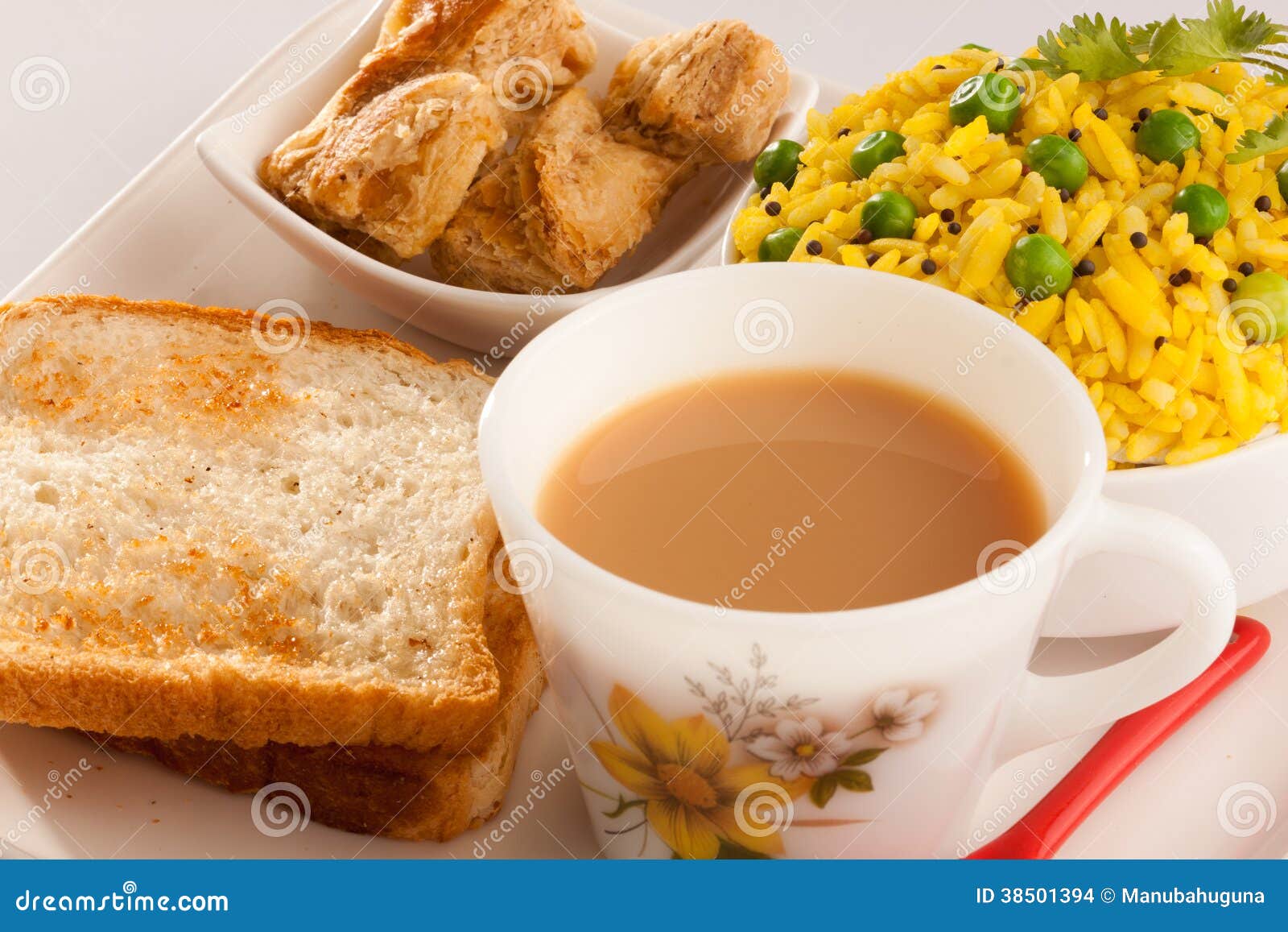 Breakfast - Tea, Poha with Bread and Biscuit. Stock Photo - Image of ...