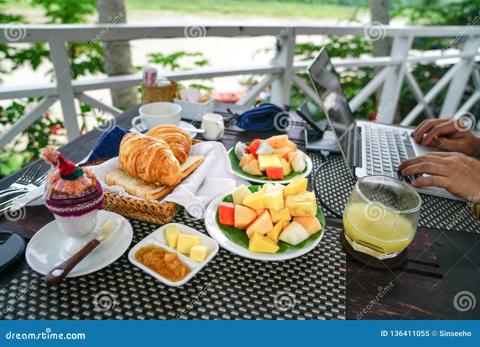 Breakfast while working stock image. Image of yummy - 136411055