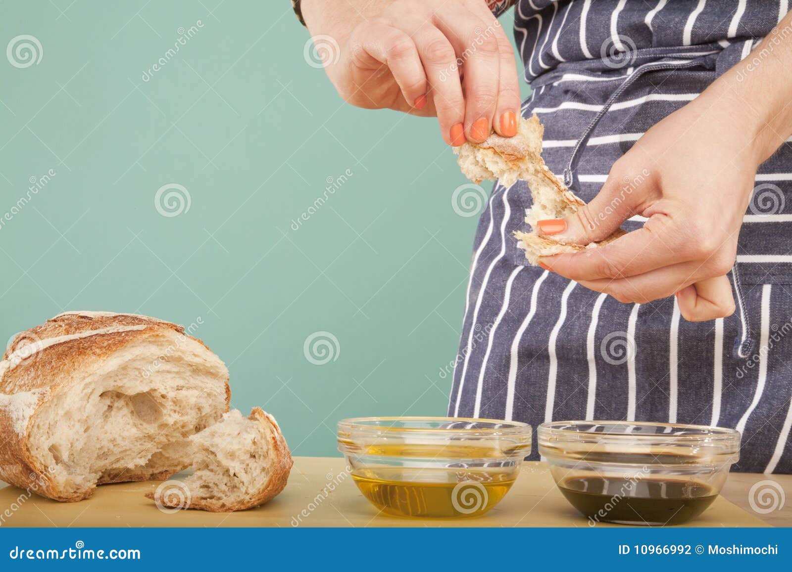 Breaking Bread stock photo. Image of olive, taste, finger - 10966992