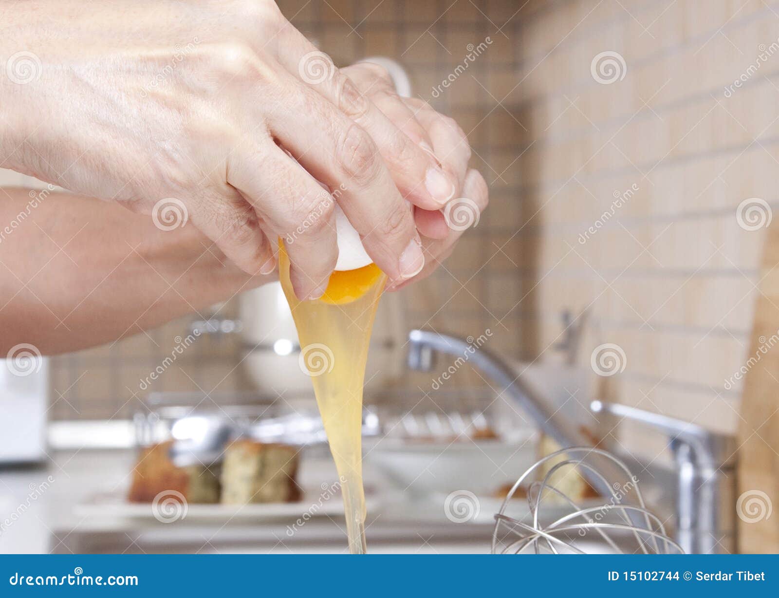 Breaking and egg stock photo. Image of cooking, counter - 15102744