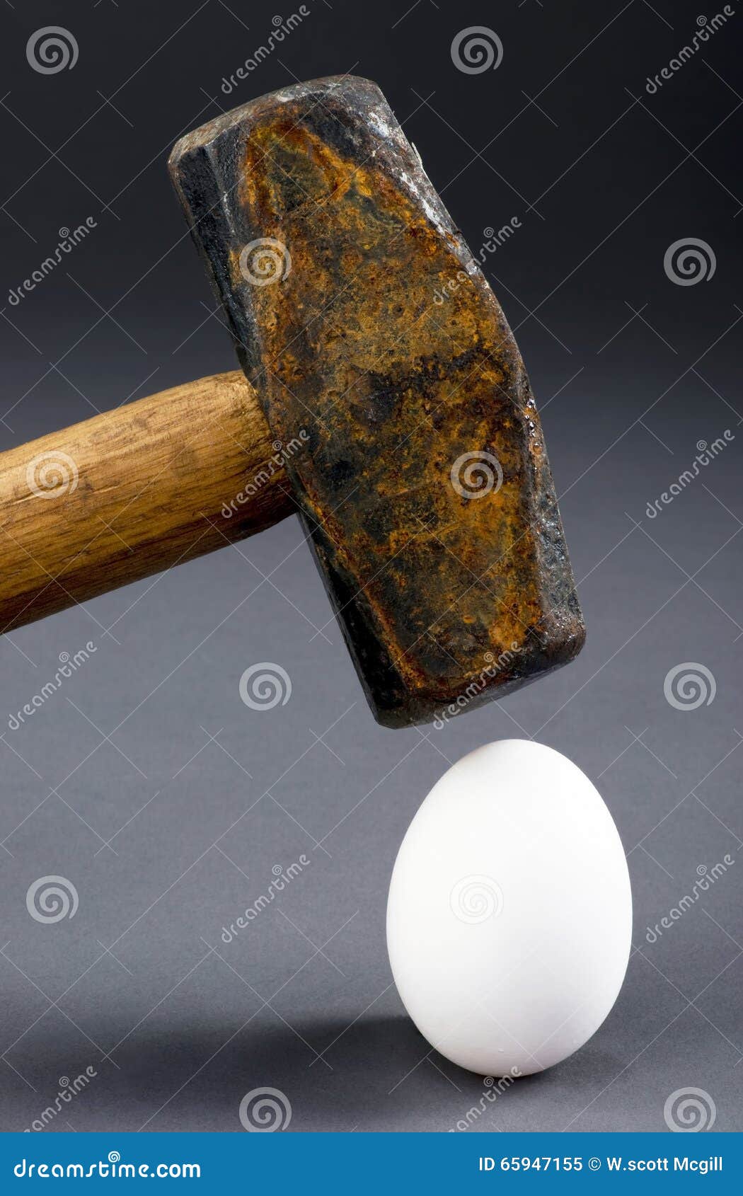 Breaking the Egg. stock image. Image of dirty, head, pounding - 65947155