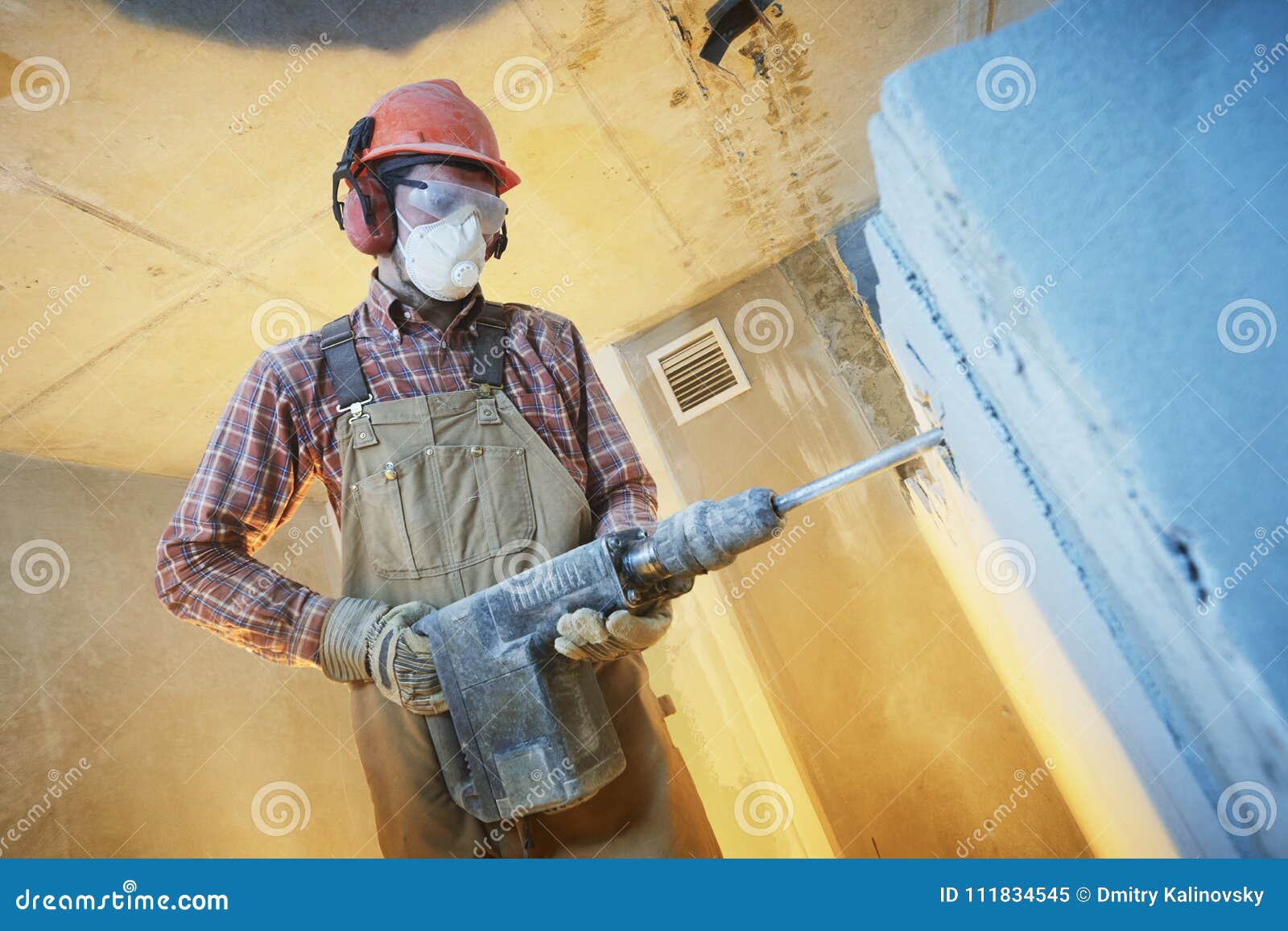 Breaking Interior Wall. Worker with Demolition Hammer Stock Image ...