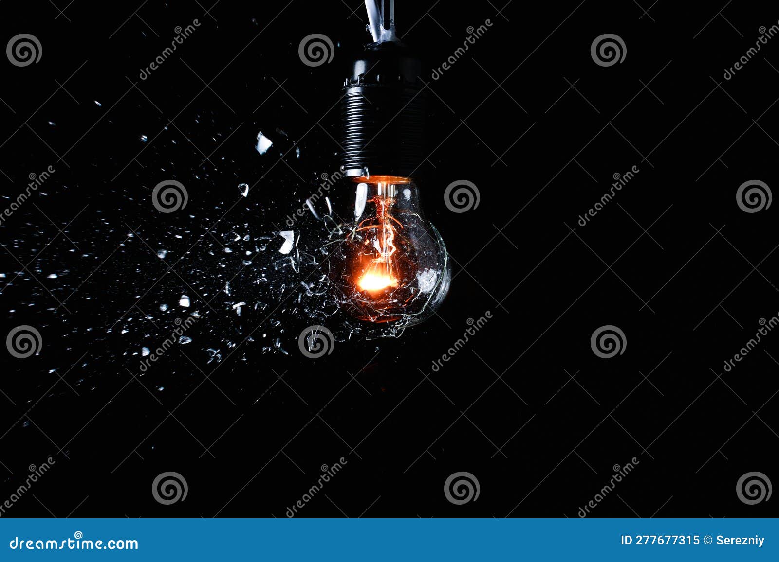 Breaking of Light Bulb on Dark Background Stock Image - Image of ...