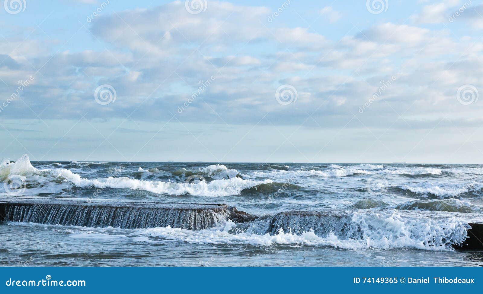 Breaking Ocean Waves stock image. Image of wall, concrete - 74149365