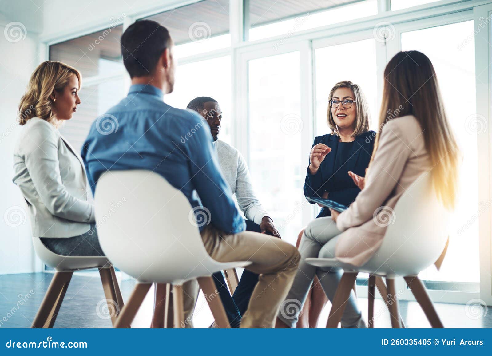 Breaking the Plan Down into Easy Steps. a Group of Corporate Colleagues ...