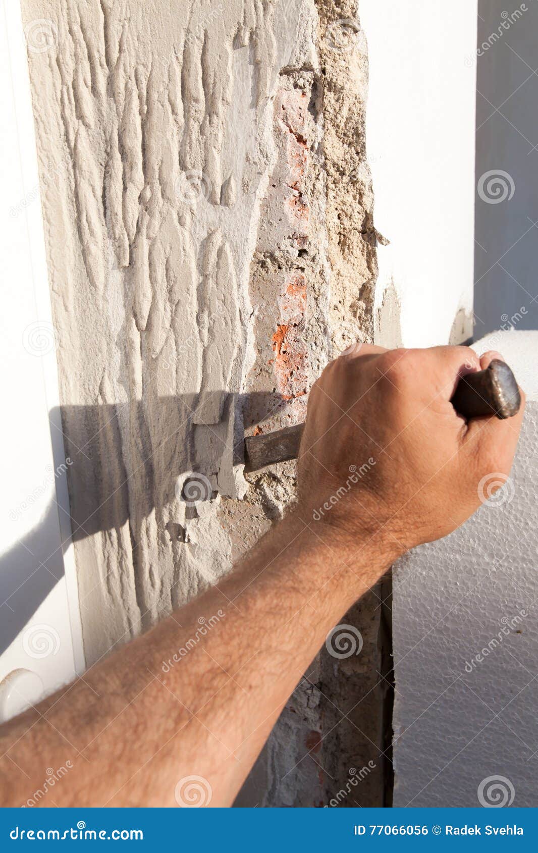 Breaking Plaster during the Reconstruction of the House. Stock Photo ...