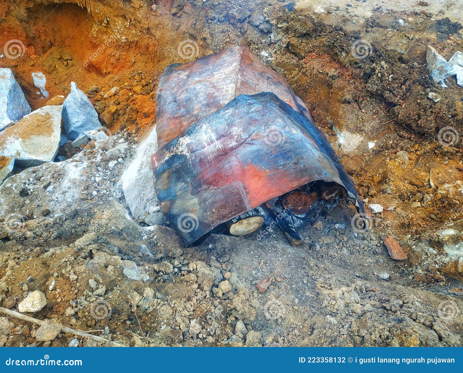 Breaking stones by burning stock photo. Image of burning - 223358132