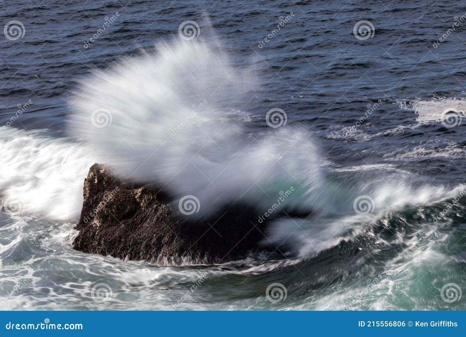 Breaking wave on rock stock photo. Image of water, rock - 215556806
