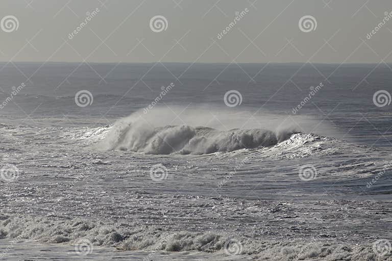 Breaking Wave with Wind Spray Stock Photo - Image of nature, closeup ...