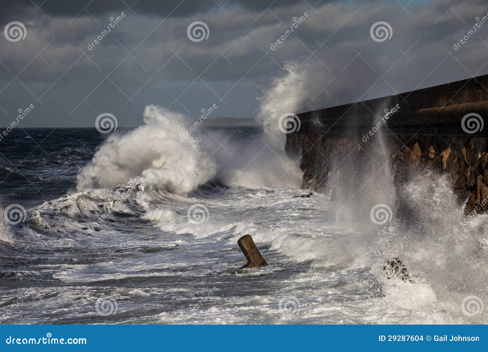 Breaking Waves Over Holyhead Breakwater Stock Photo - Image of irish ...