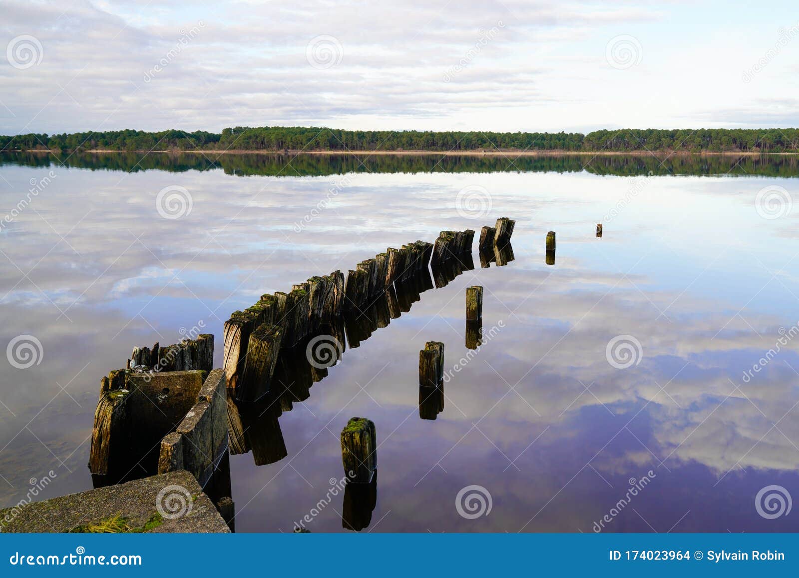 Breaks Waves on Sanguinet Lake Mirror Image in Blue Water Cloud Sky ...