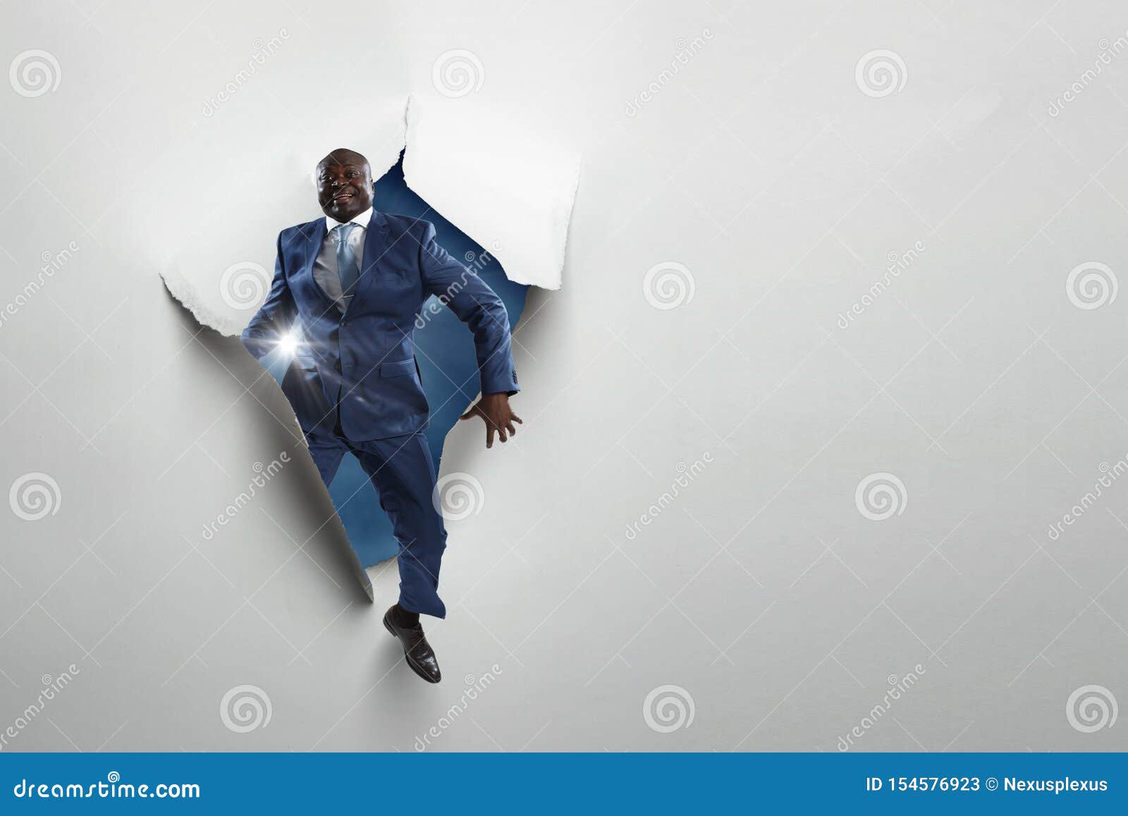 Breakthrough Paper Hole with a Black Businessman Stock Image - Image of ...