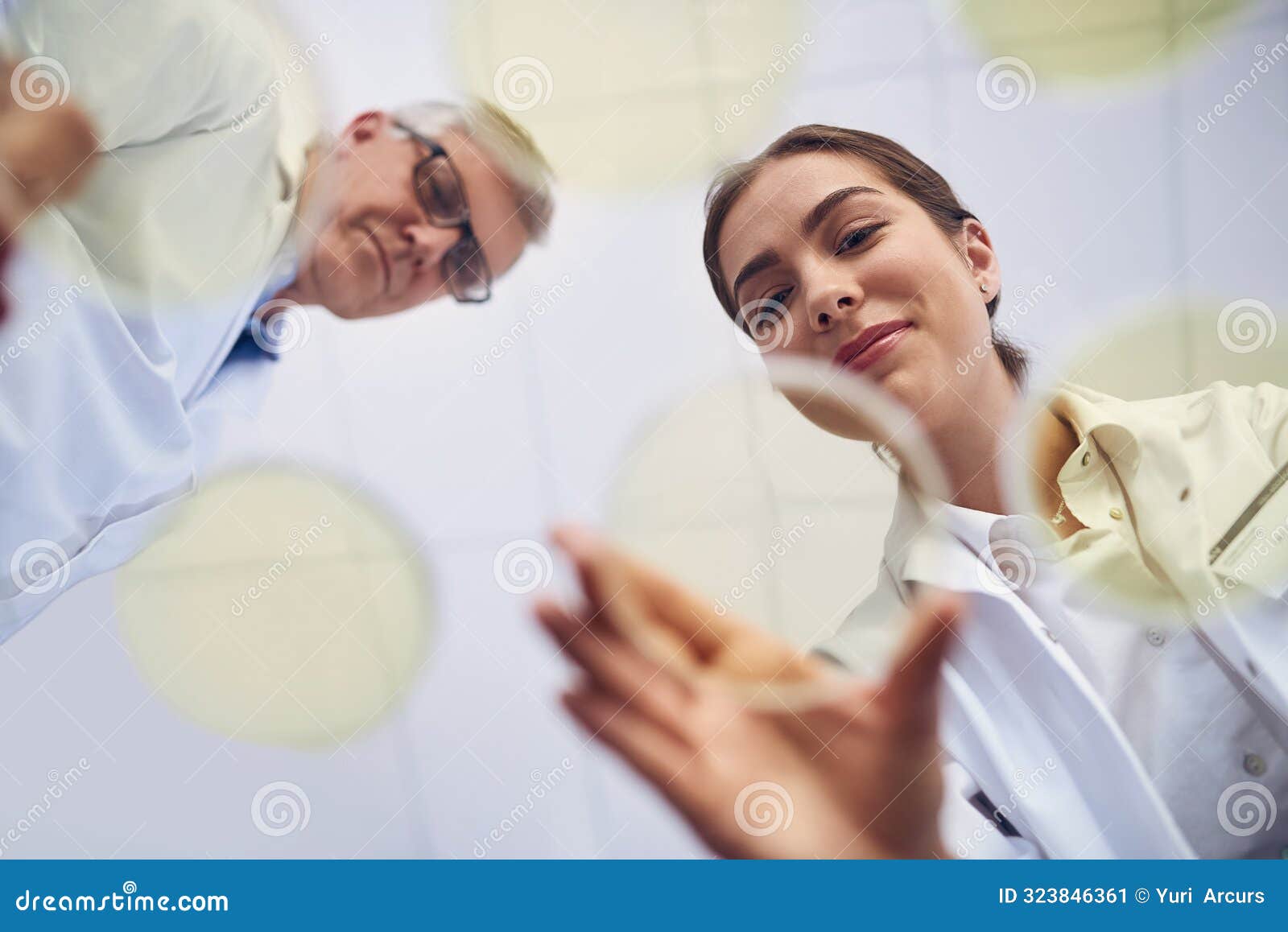 Breakthrough, Science and Teamwork with People in Laboratory from Below ...