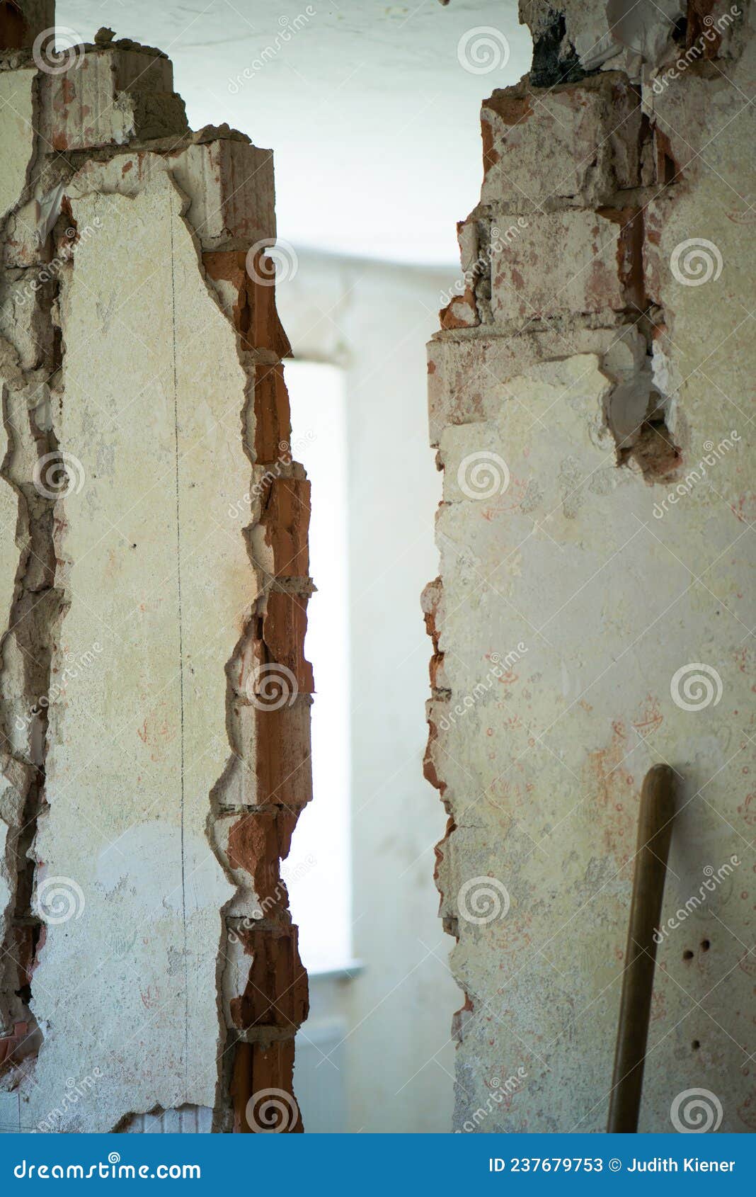 Breakthrough in a wall stock image. Image of person - 237679753