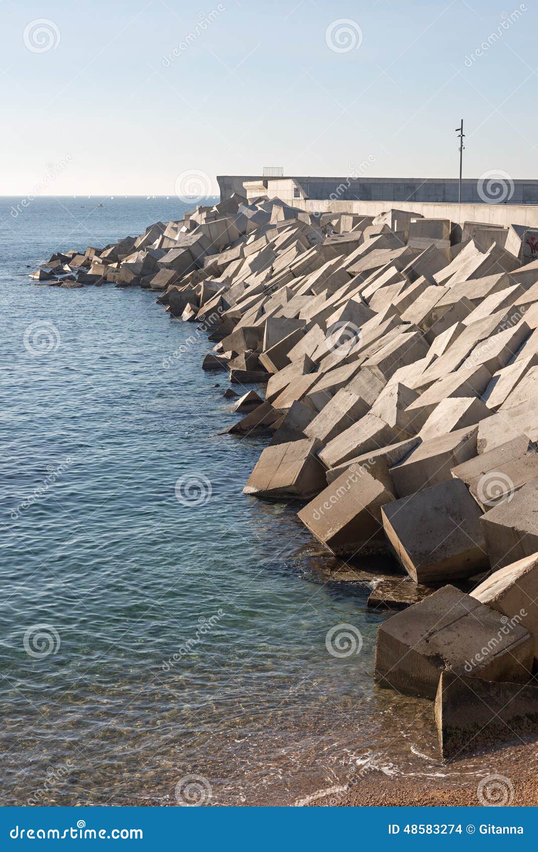 Breakwater cement blocks stock photo. Image of seawall - 48583274