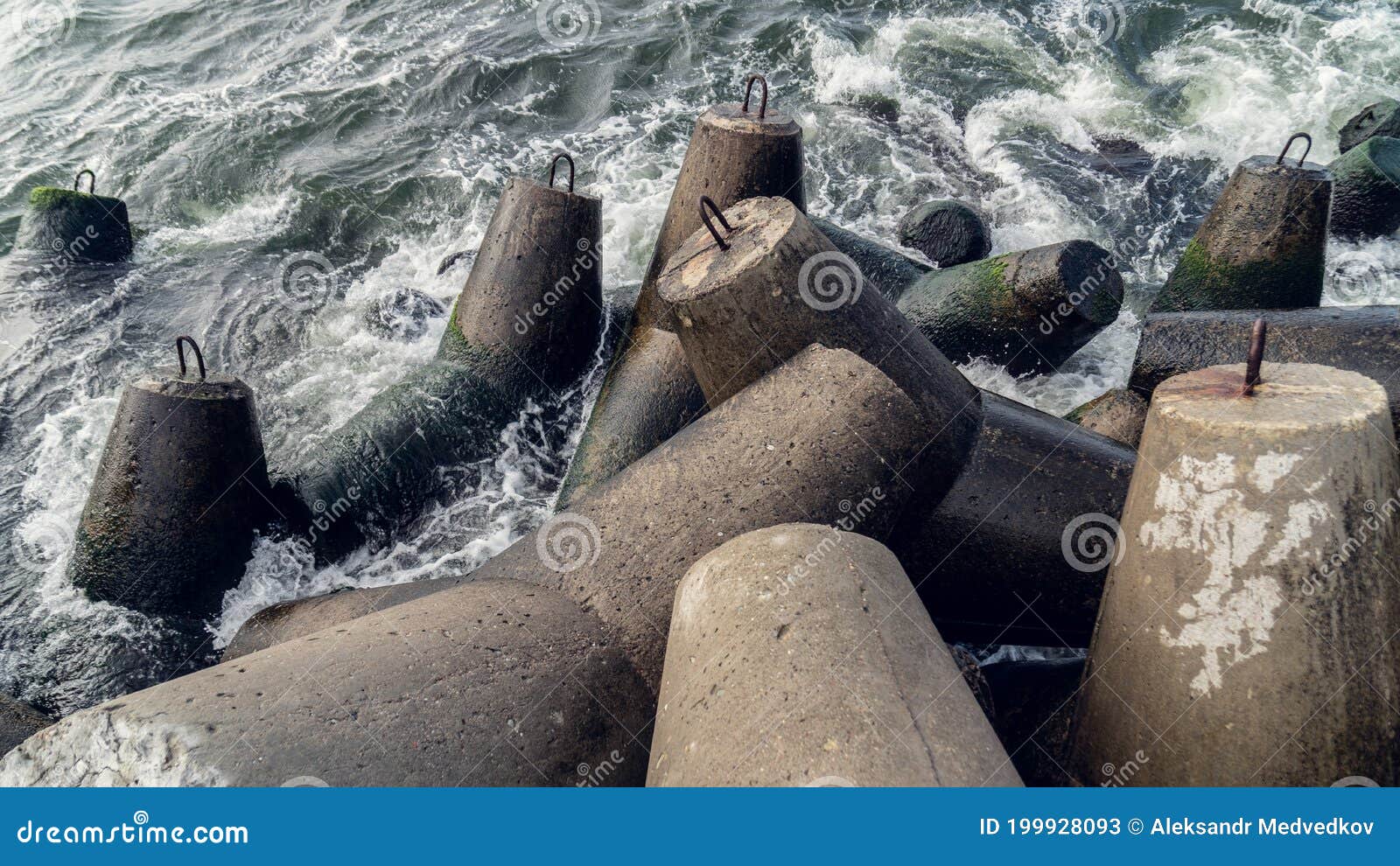 Breakwaters on the shore stock image. Image of wave - 199928093