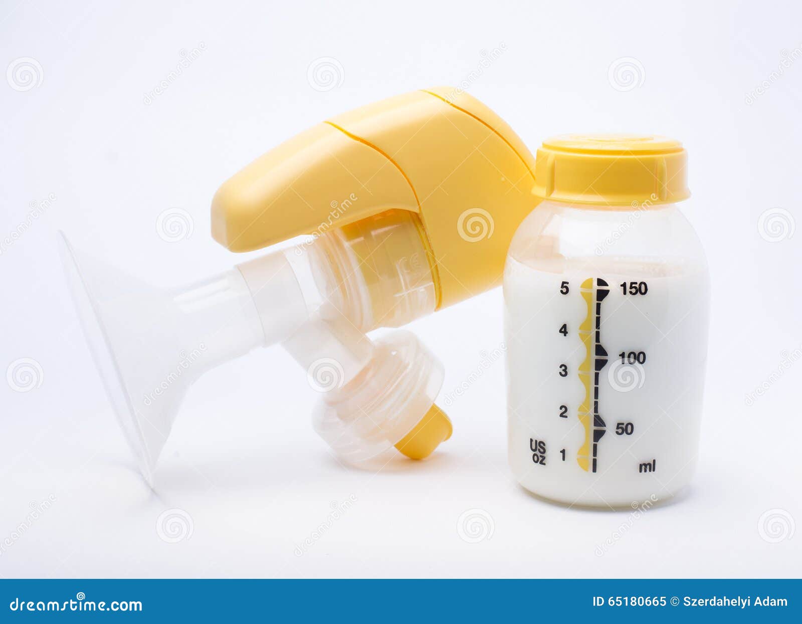 Breast pump with milk stock image. Image of isolated - 65180665