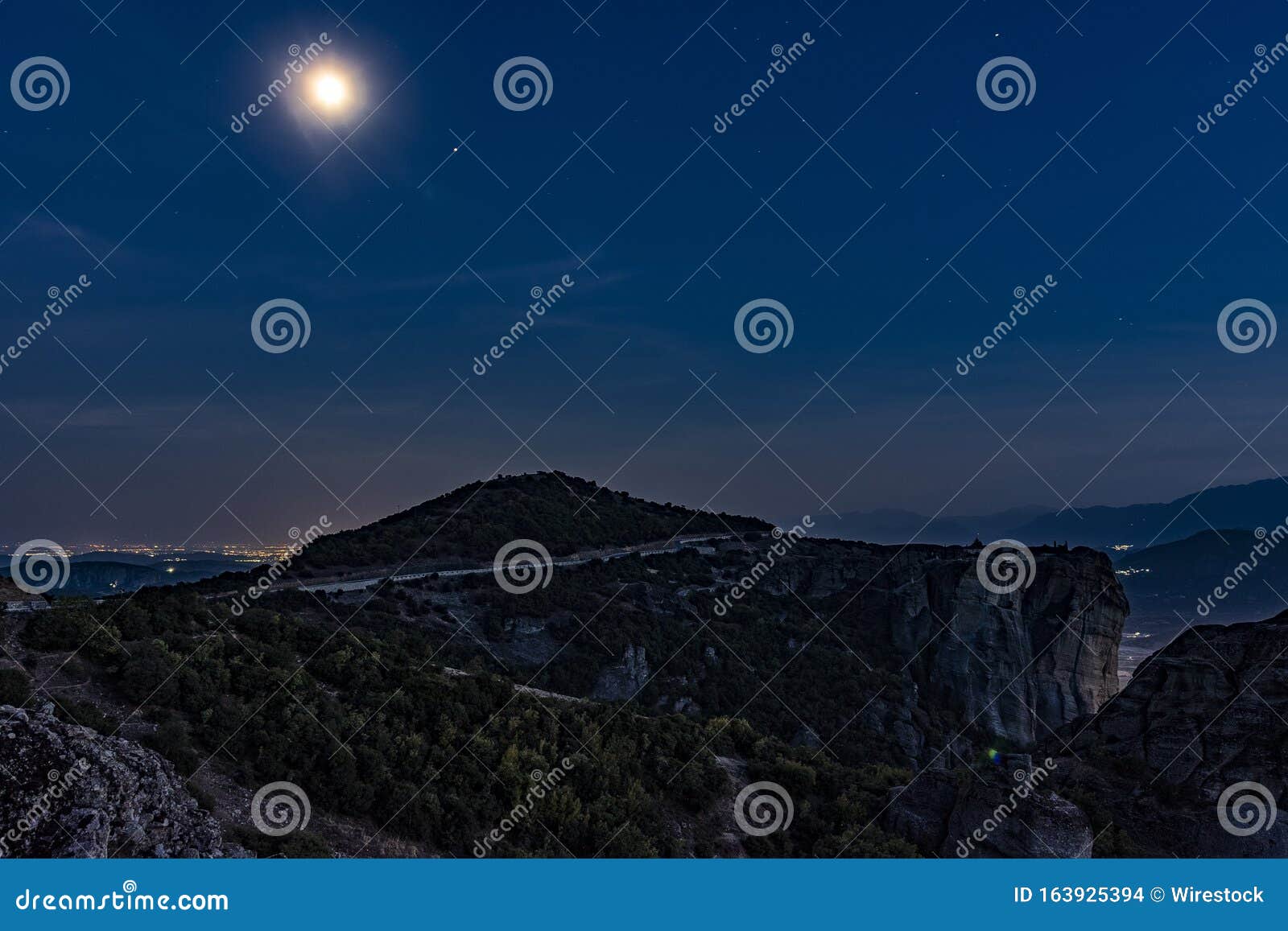 Breathtaking View of the Cliffs Captured Under the Full Moon in the Sky ...