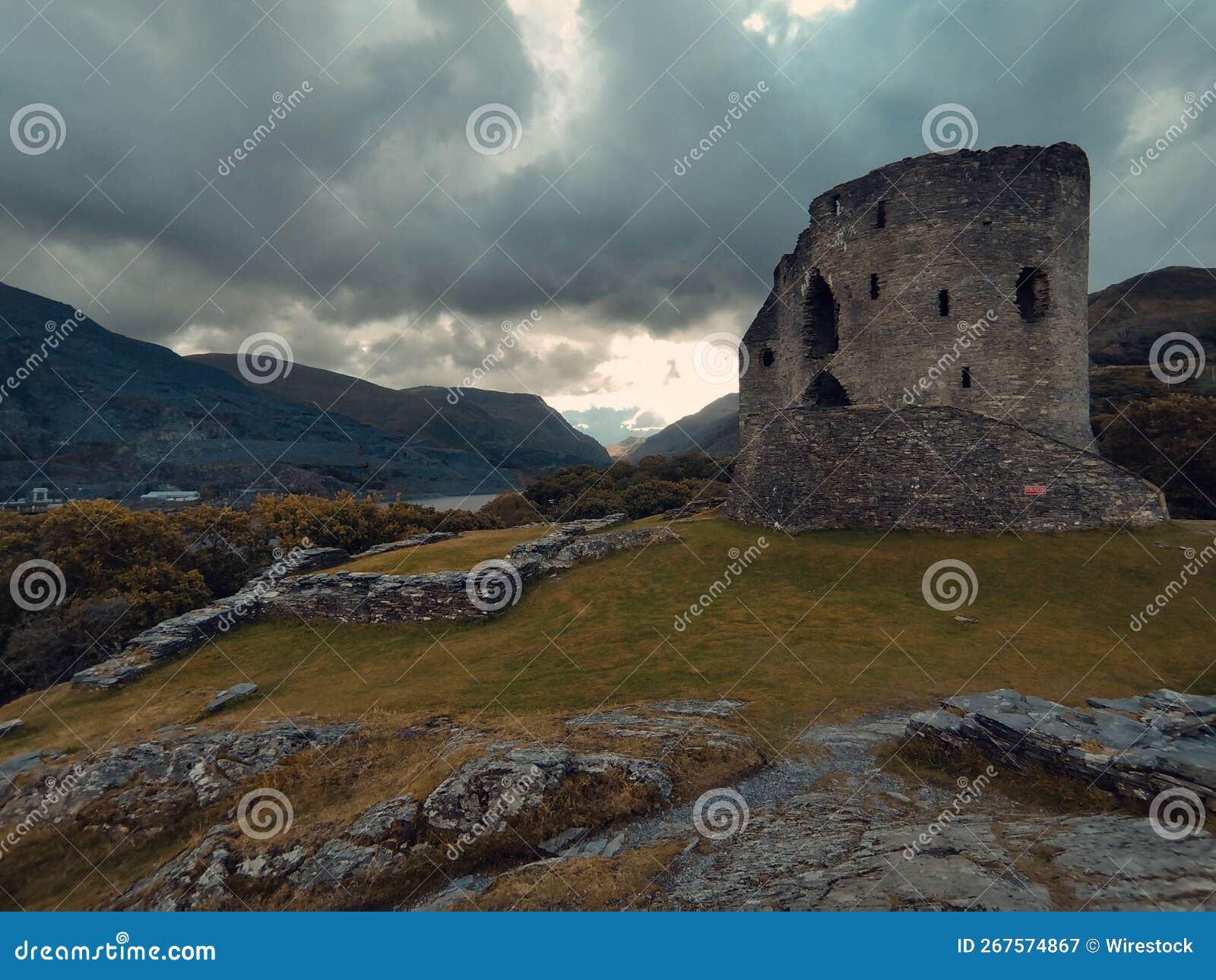 Breathtaking View of Dolbadarn Castle Under Dramatic Cloudy Sky in ...