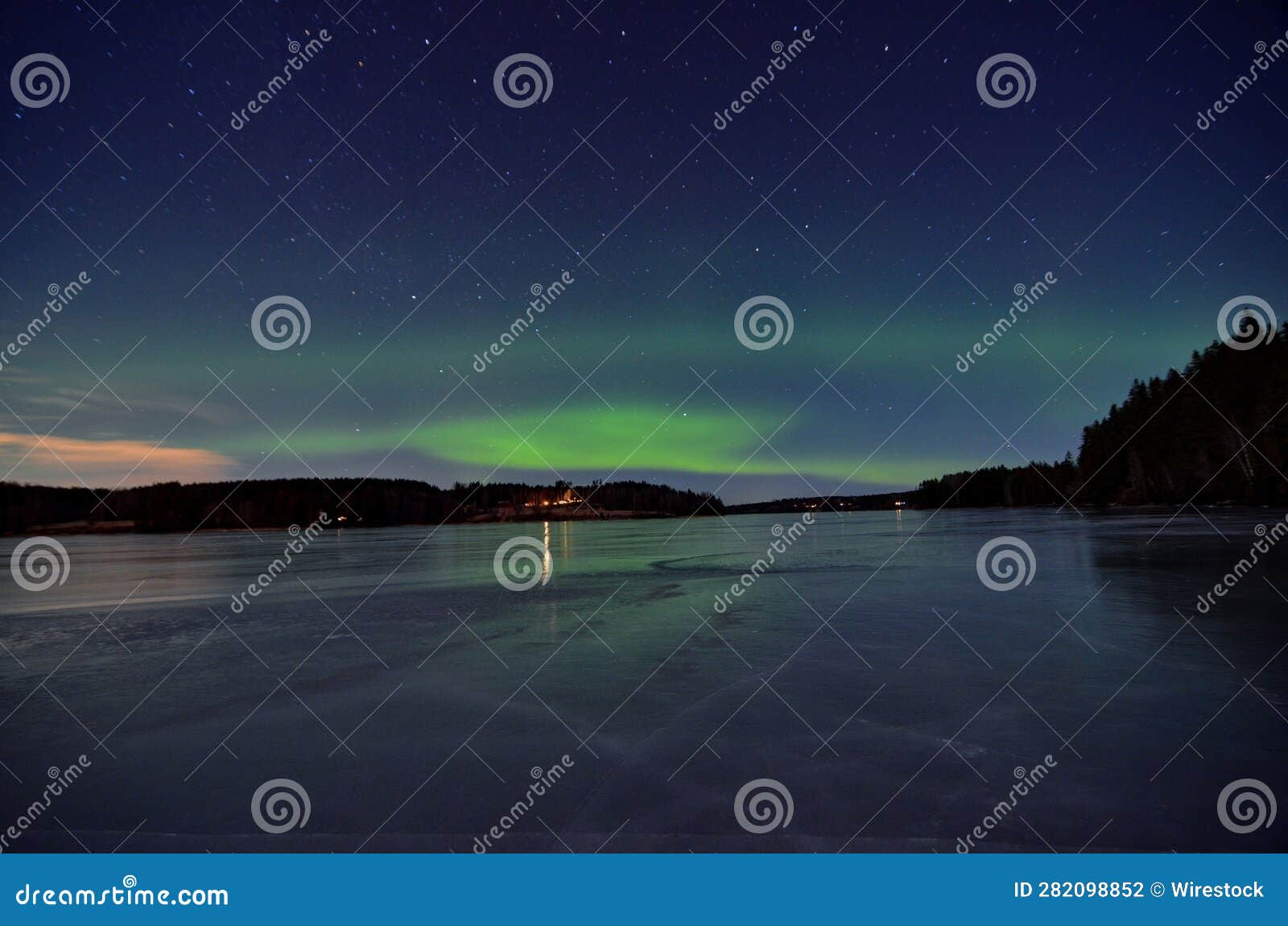 Breathtaking View of a Lake Illuminated by the Dramatic Aurora Borealis ...